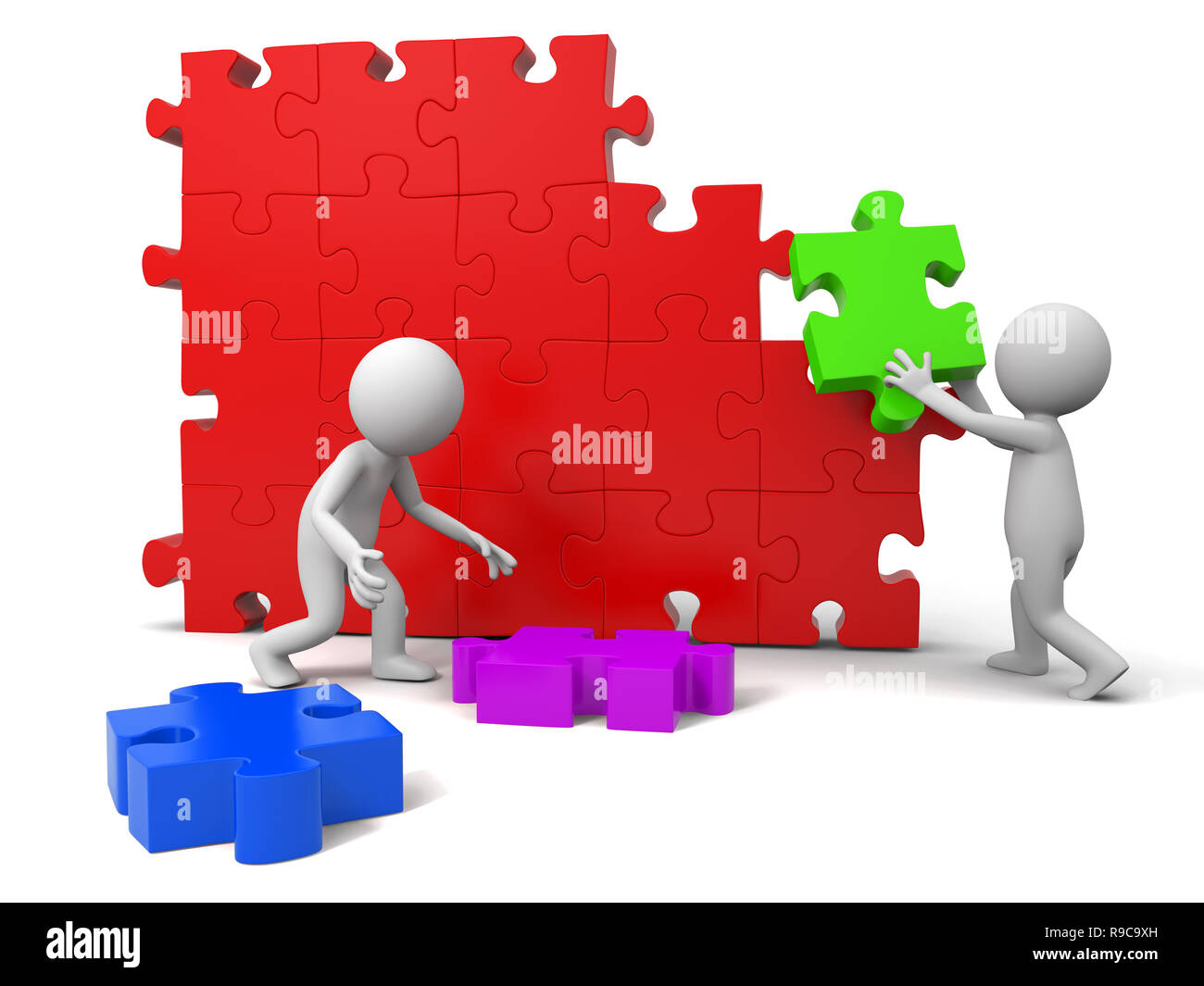 Two people are moving the puzzles Stock Photo - Alamy