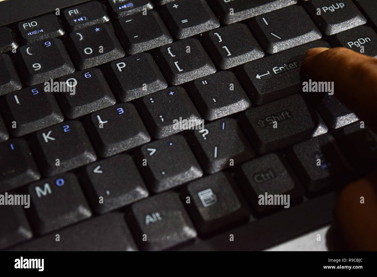 Hand male press keyboard computer on selective focus background Stock ...