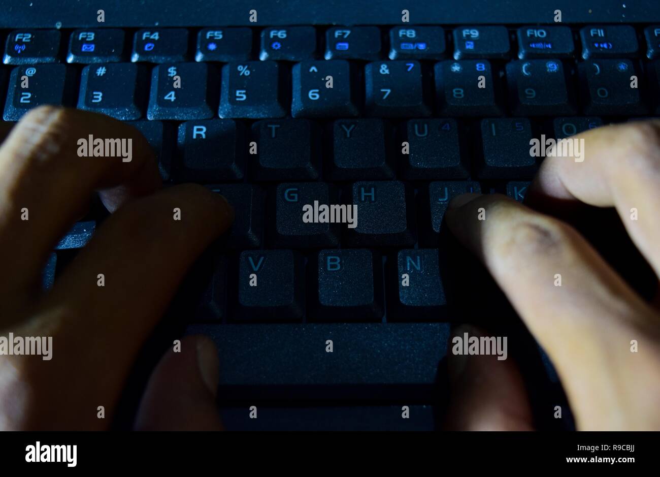 Hand male press keyboard computer on selective focus background Stock ...