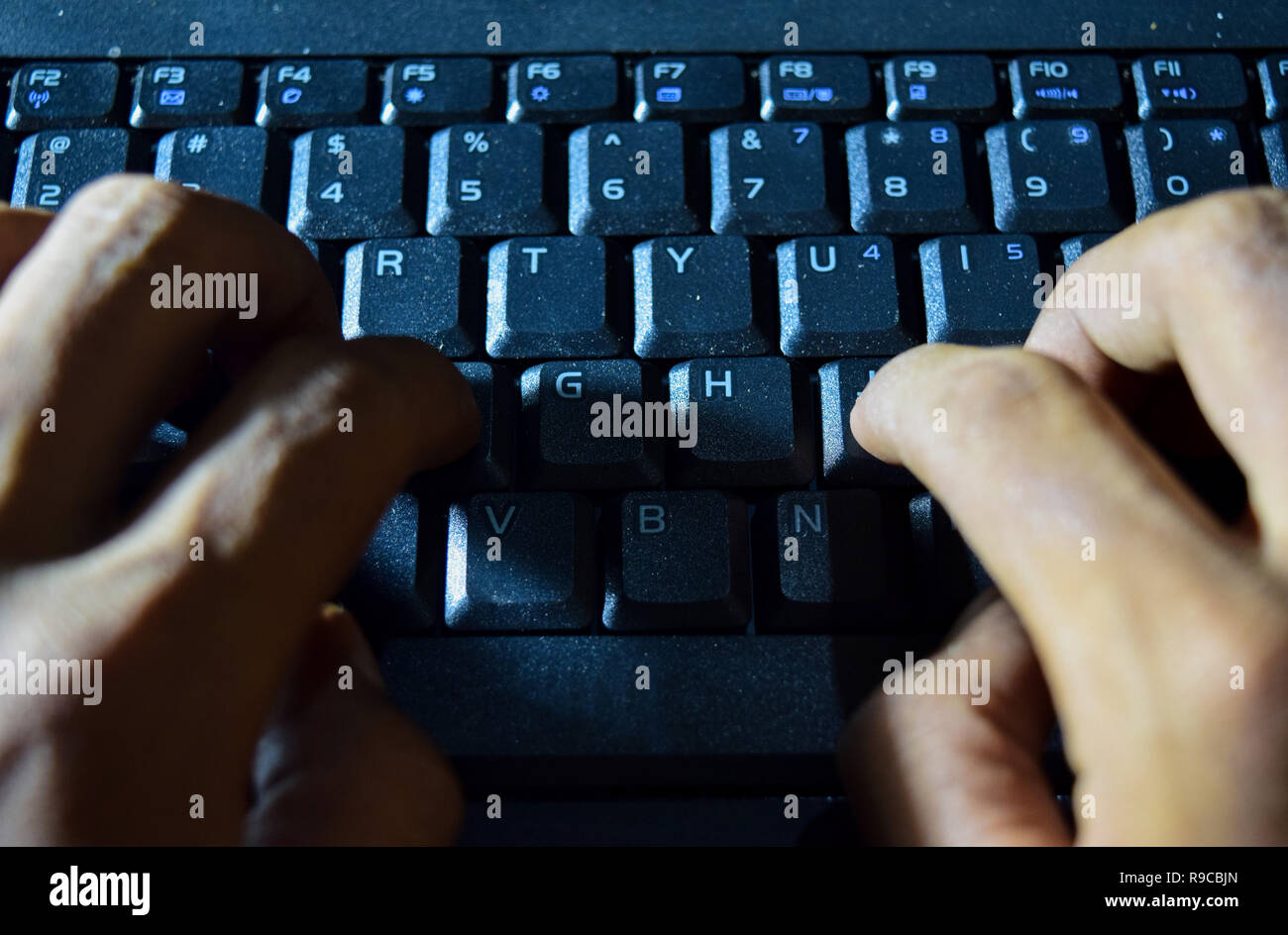 Hand male press keyboard computer on selective focus background Stock ...