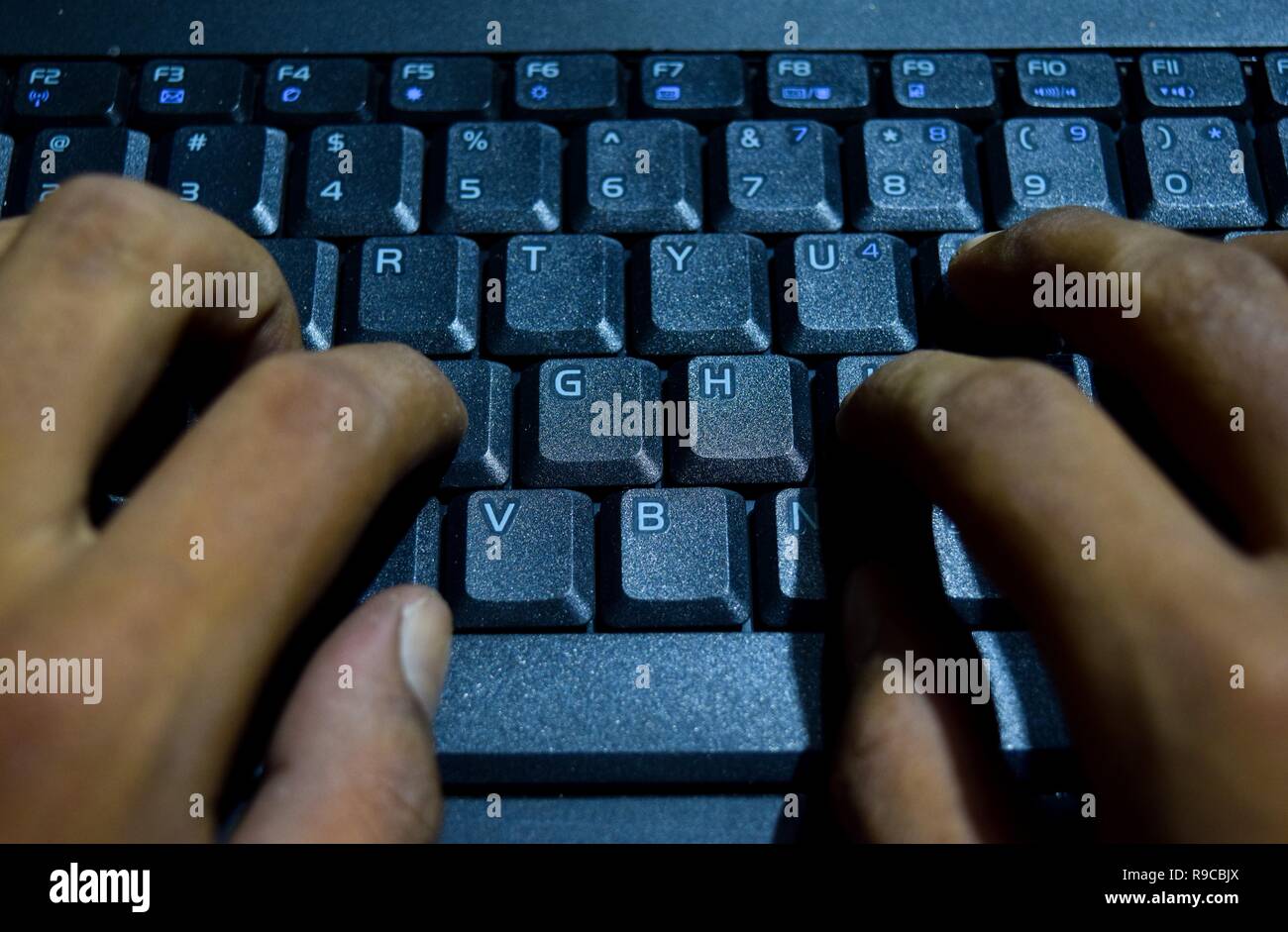 Hand male press keyboard computer on selective focus background Stock ...