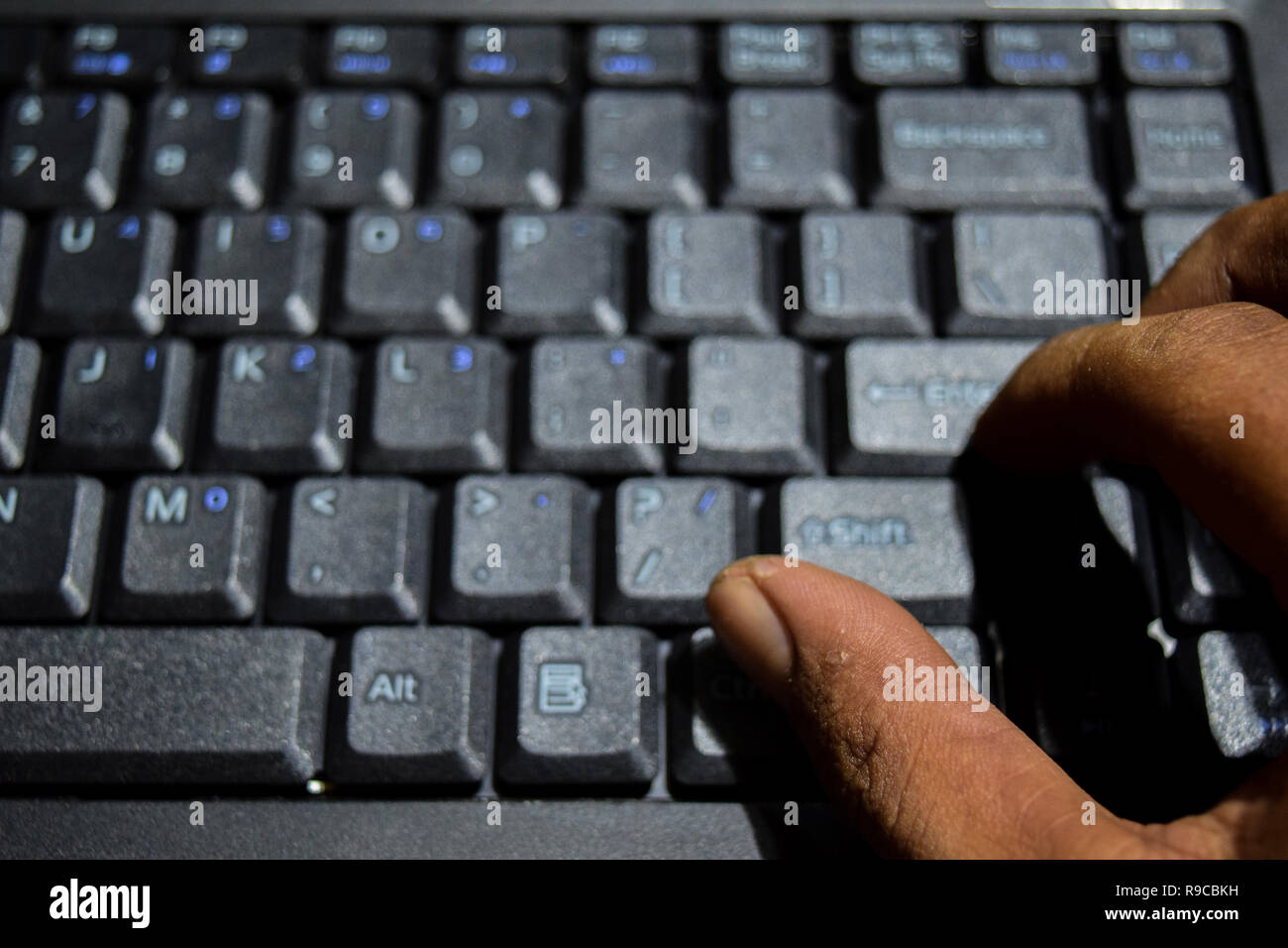 Hand male press keyboard computer on selective focus background Stock ...