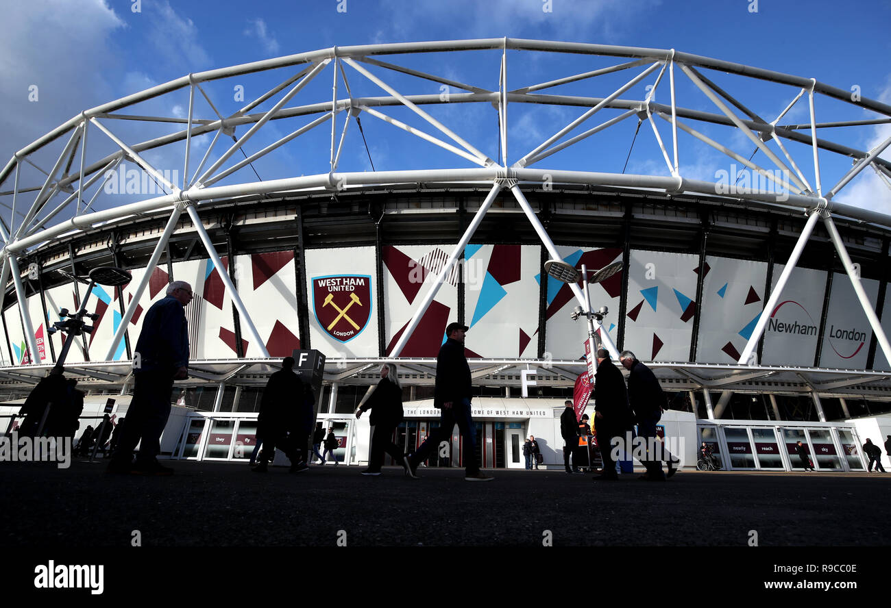 Fans arrive at the London Stadium before the Premier League match at ...