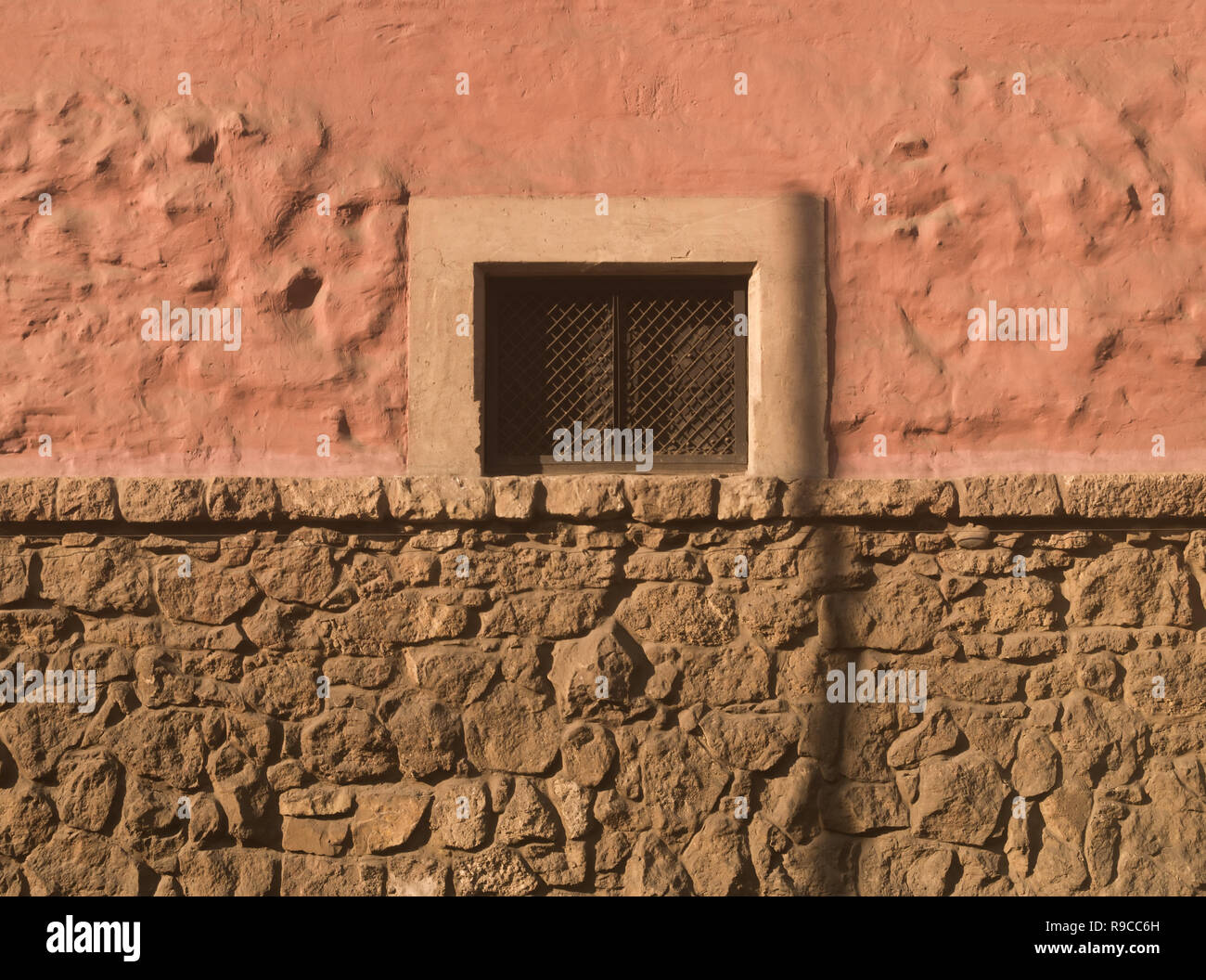 old window with bars on the wall Stock Photo - Alamy