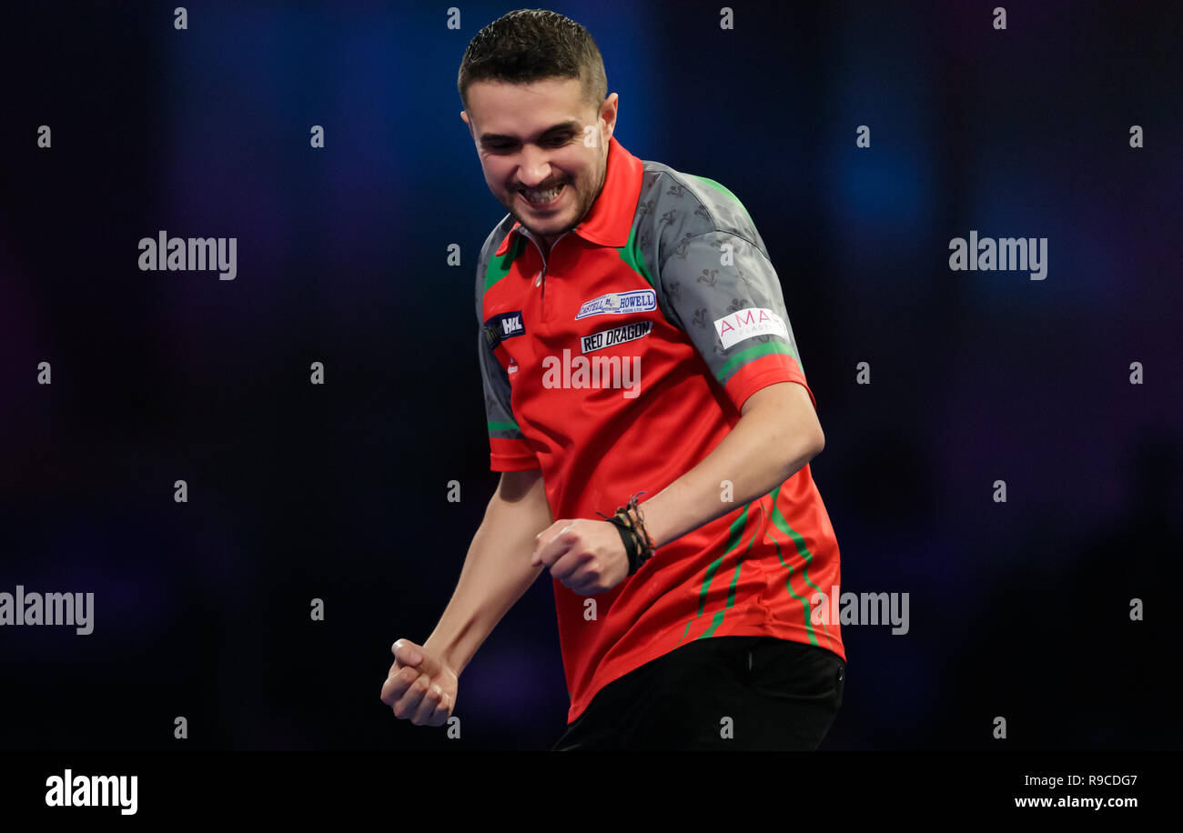 Jamie Lewis celebrates during his match against Daryl Gurney during day ...