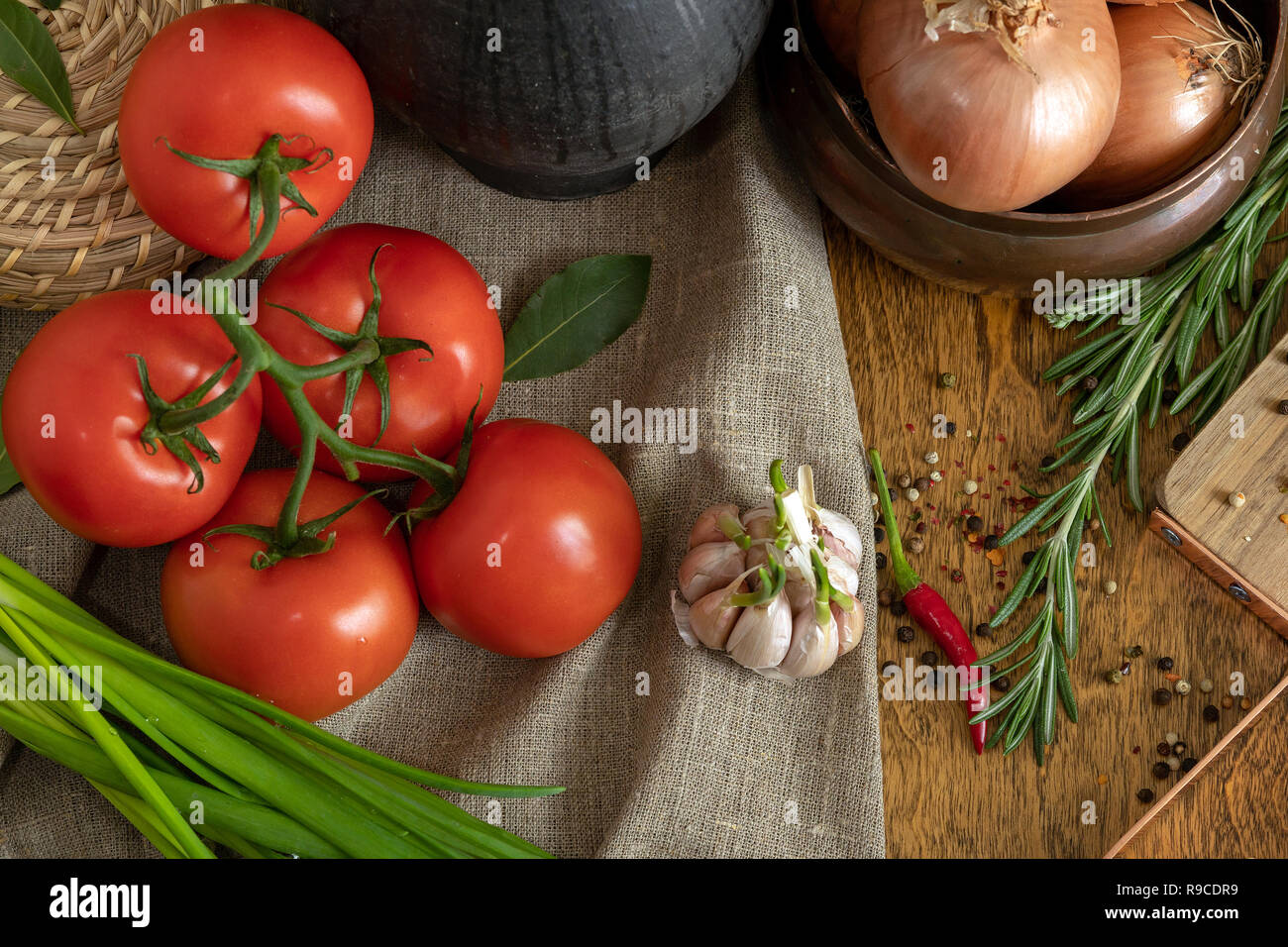 Raw beef burger, traditional barbecue, still life with vegetables and ...