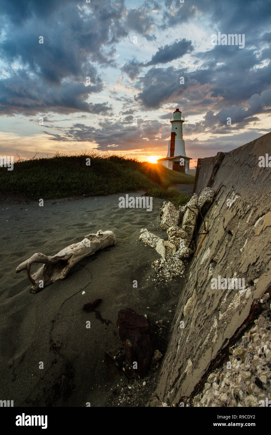 Beautiful seascape of the Plumb Point Lighthouse at Sunset/Sunrise ...