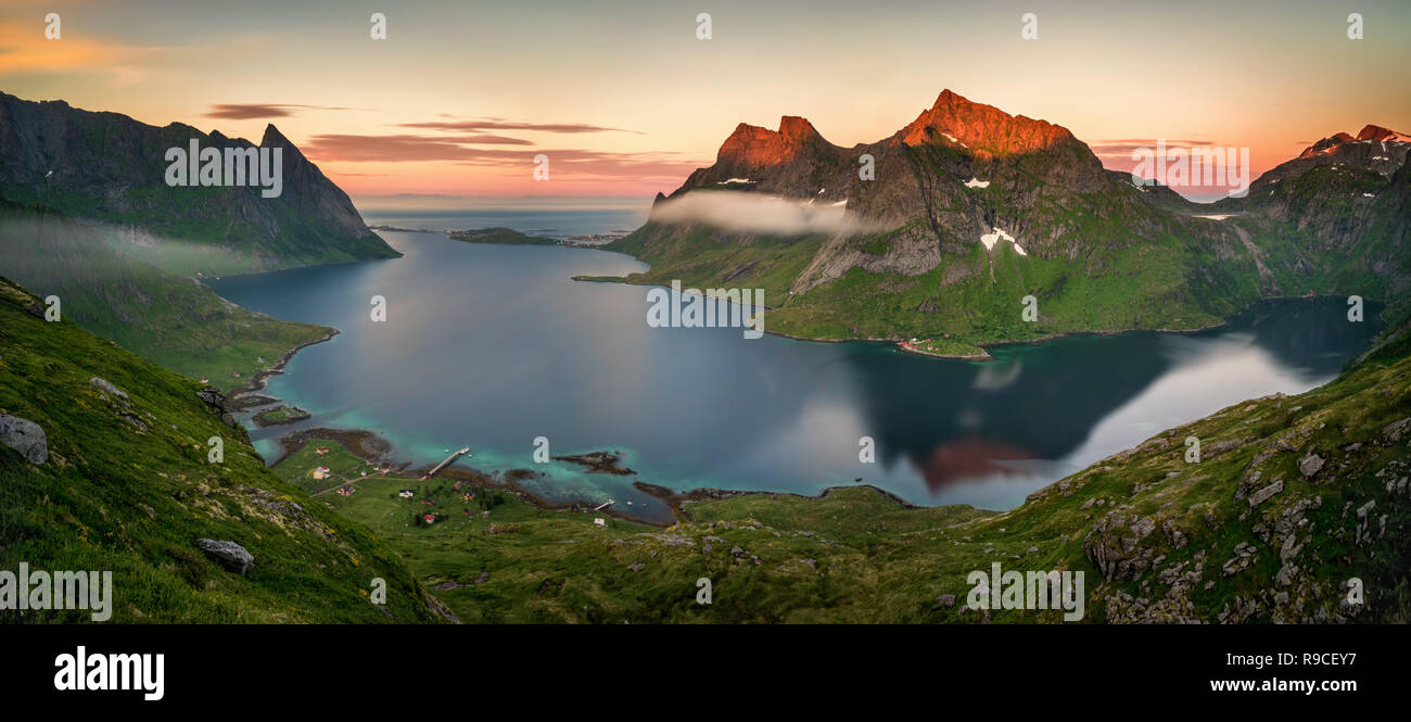 Panorama of colorful mountains and fjord with reflections on ...