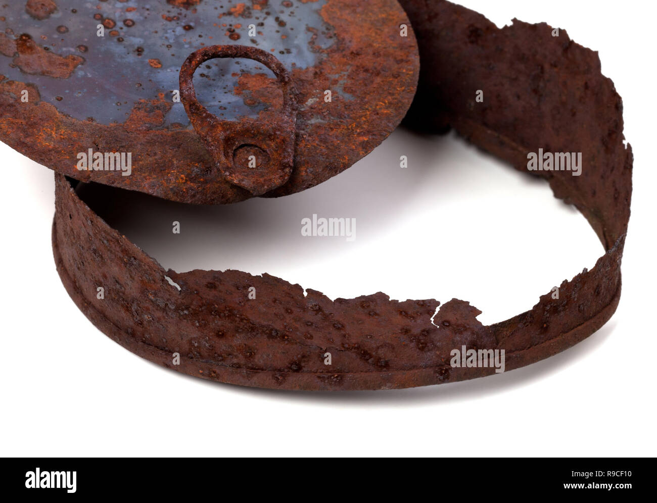 Old crushed rusty tin can hi-res stock photography and images - Alamy