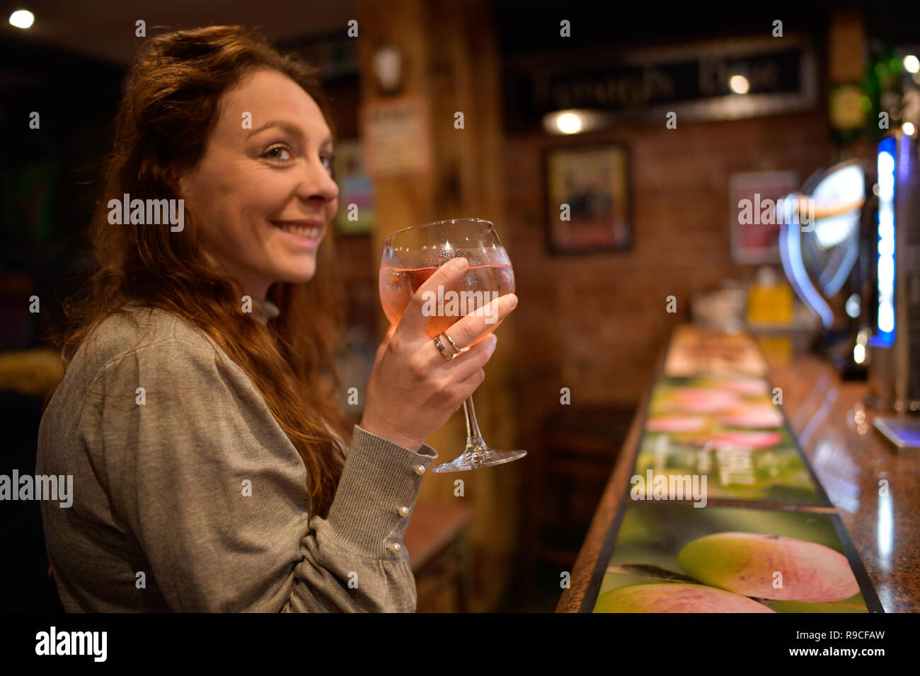 Woman drinking gin hi-res stock photography and images - Alamy