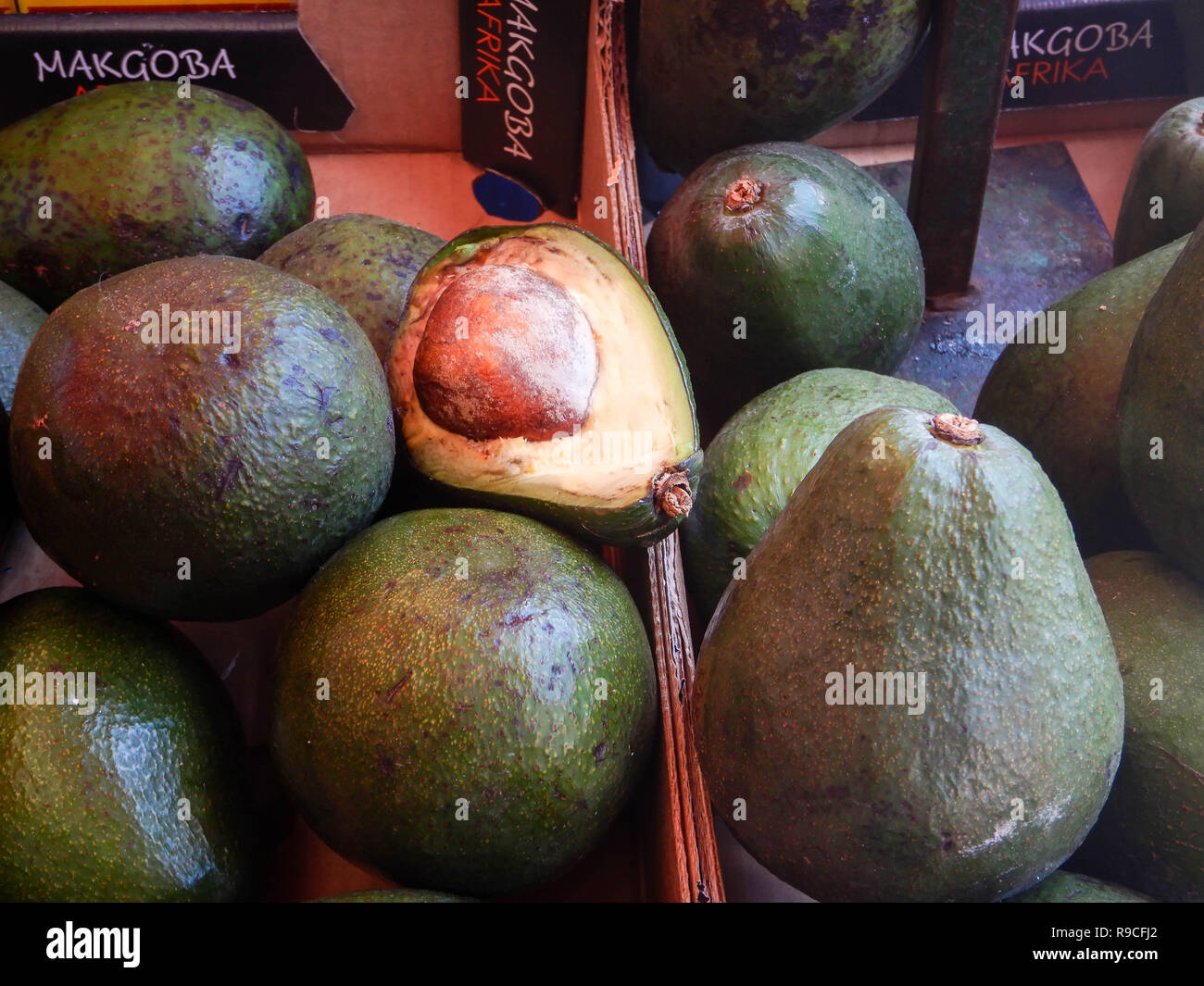 Avocado on the counter at the market Stock Photo - Alamy