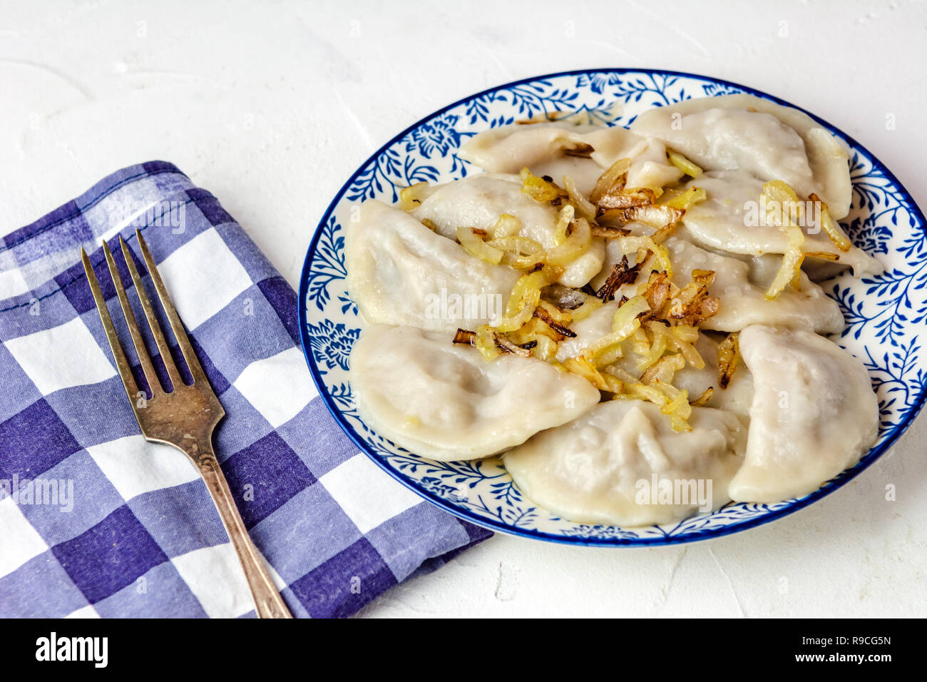 Traditional Ukrainian dumplings, filled with mashed potato and cabbage ...