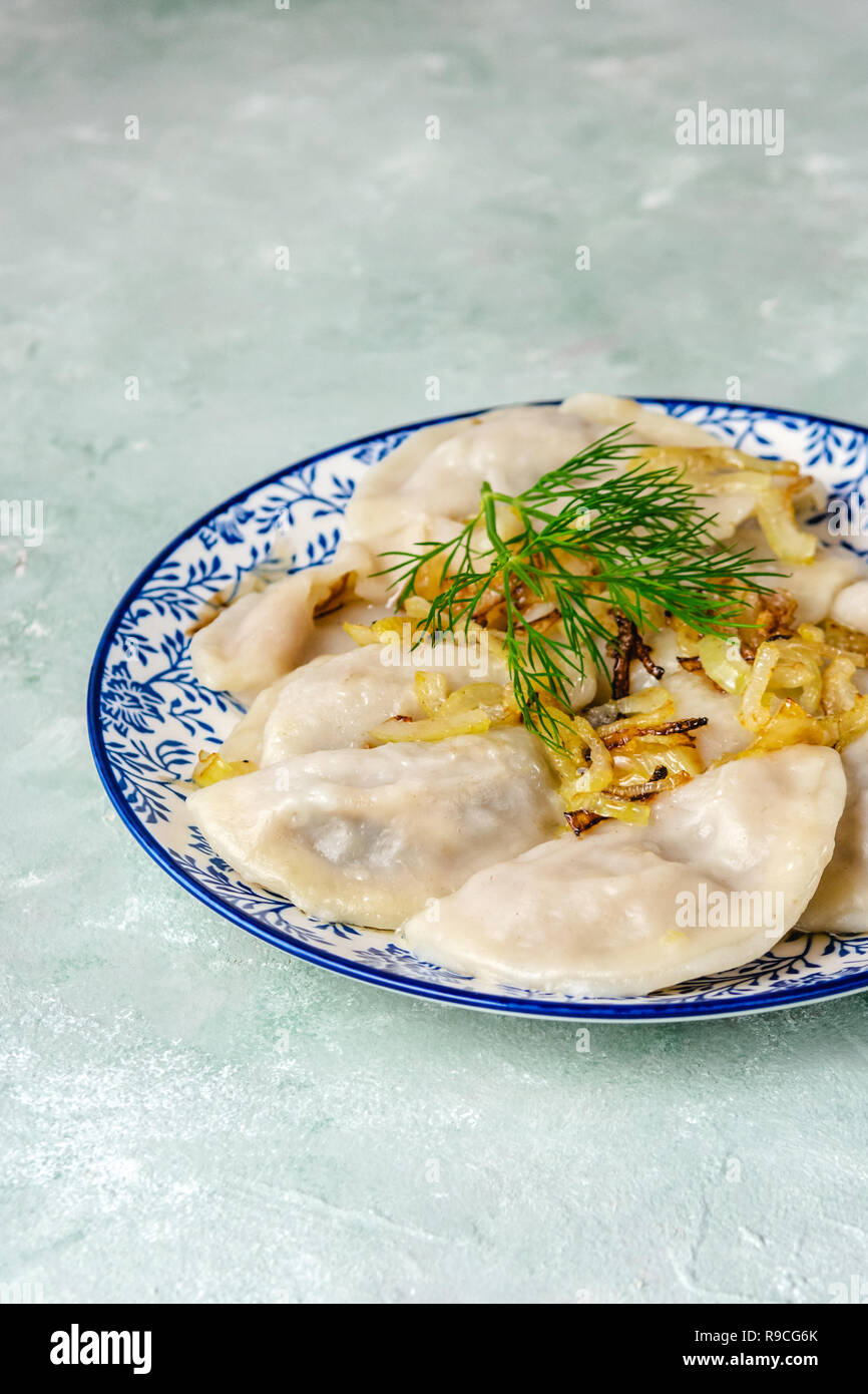 Traditional Ukrainian dumplings, filled with mashed potato and cabbage ...