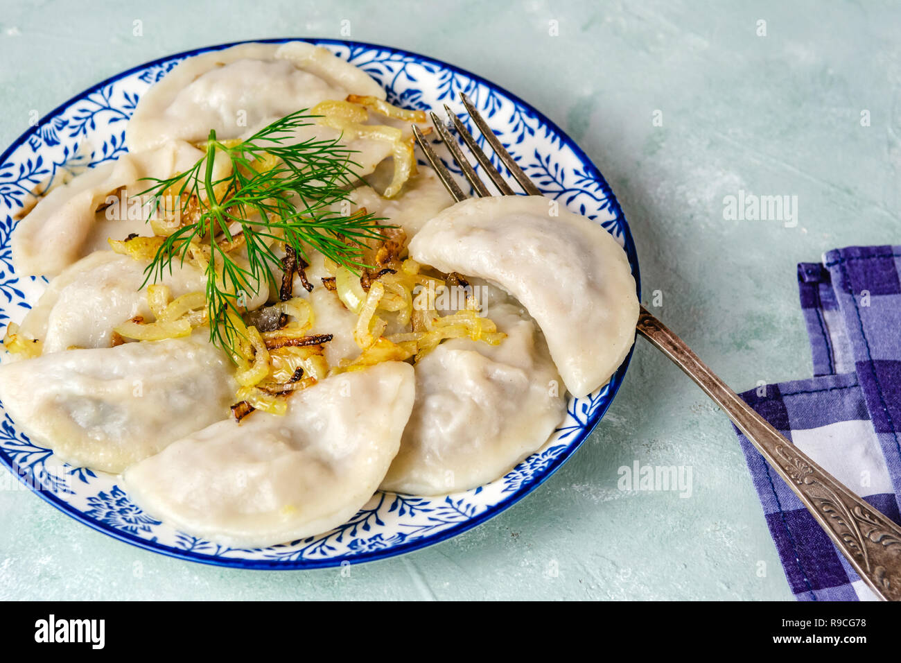 Traditional Ukrainian dumplings, filled with mashed potato and cabbage ...