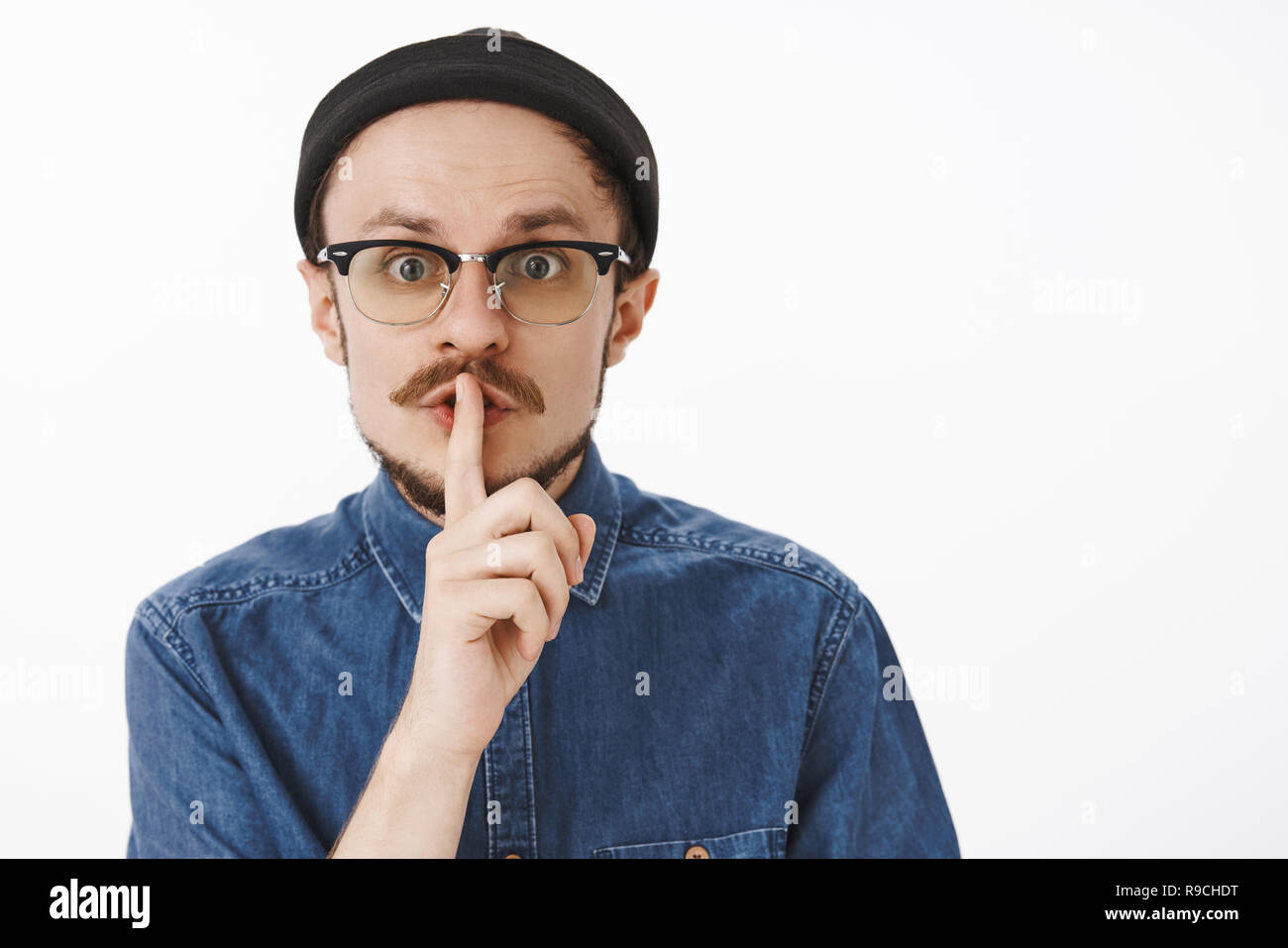 Shushing man close up hi-res stock photography and images - Alamy