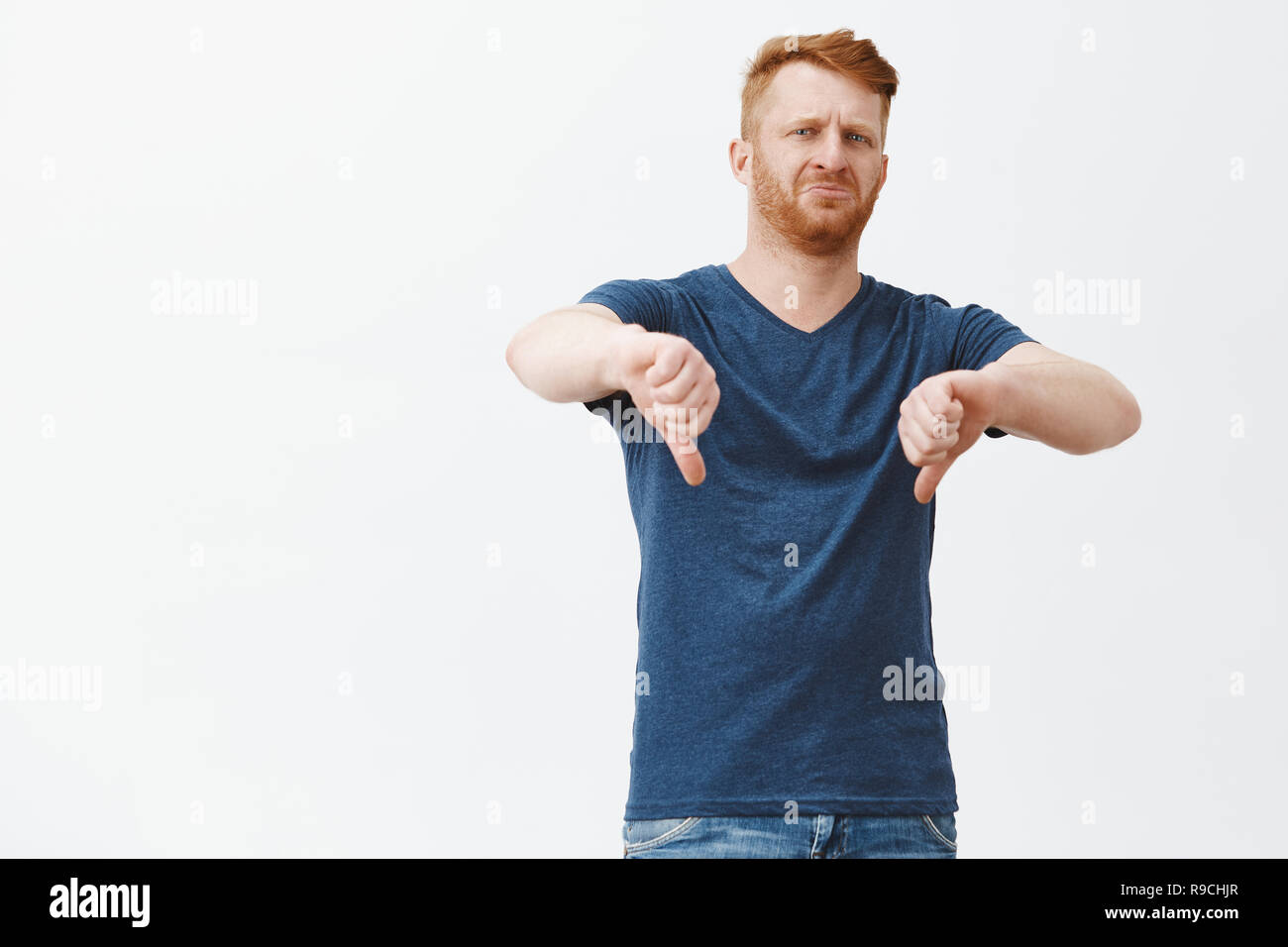 Businessman thumbs down hi-res stock photography and images - Alamy