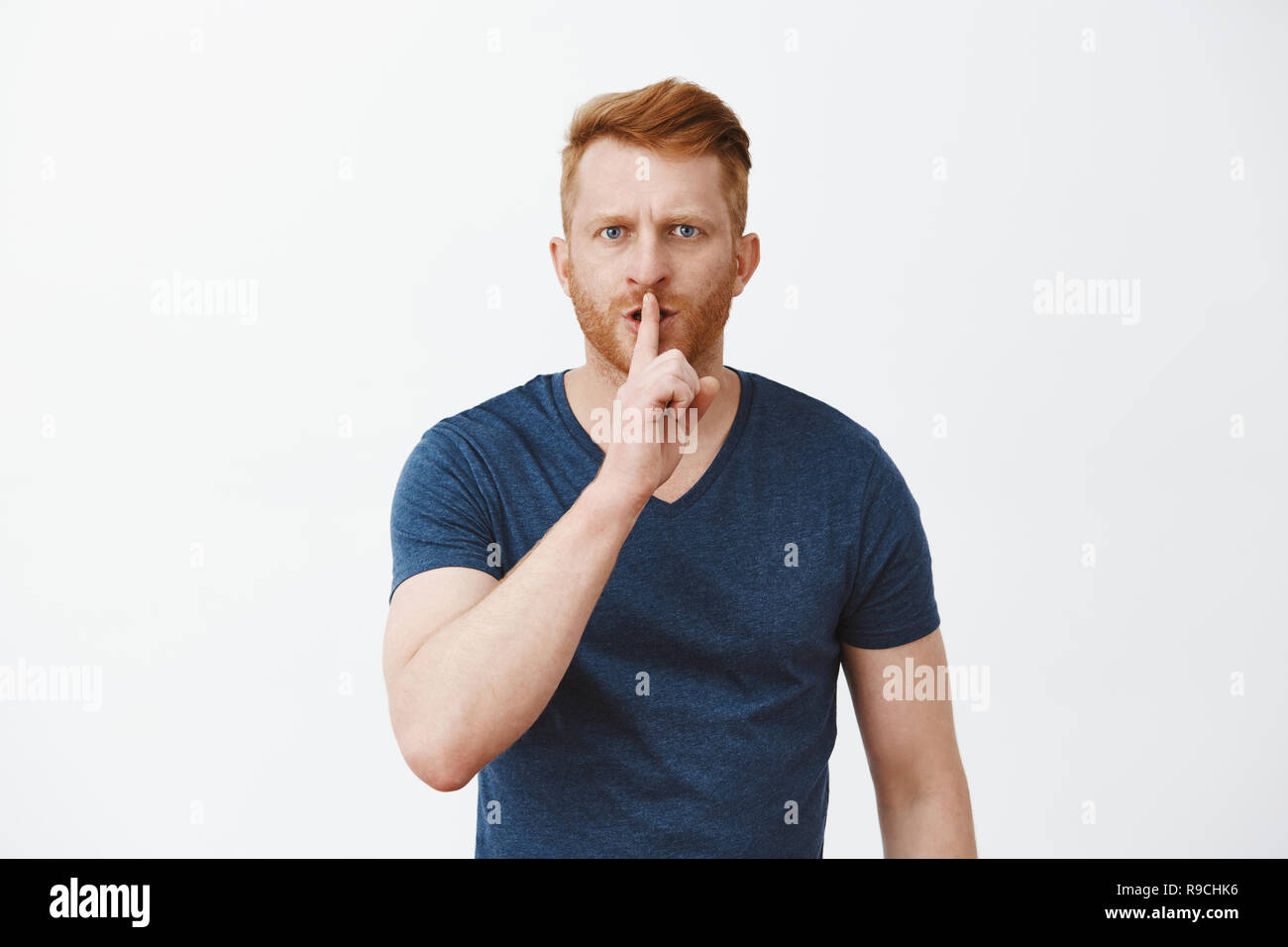 Shh I need concentrate. Portrait of intense serious-looking displeased ...