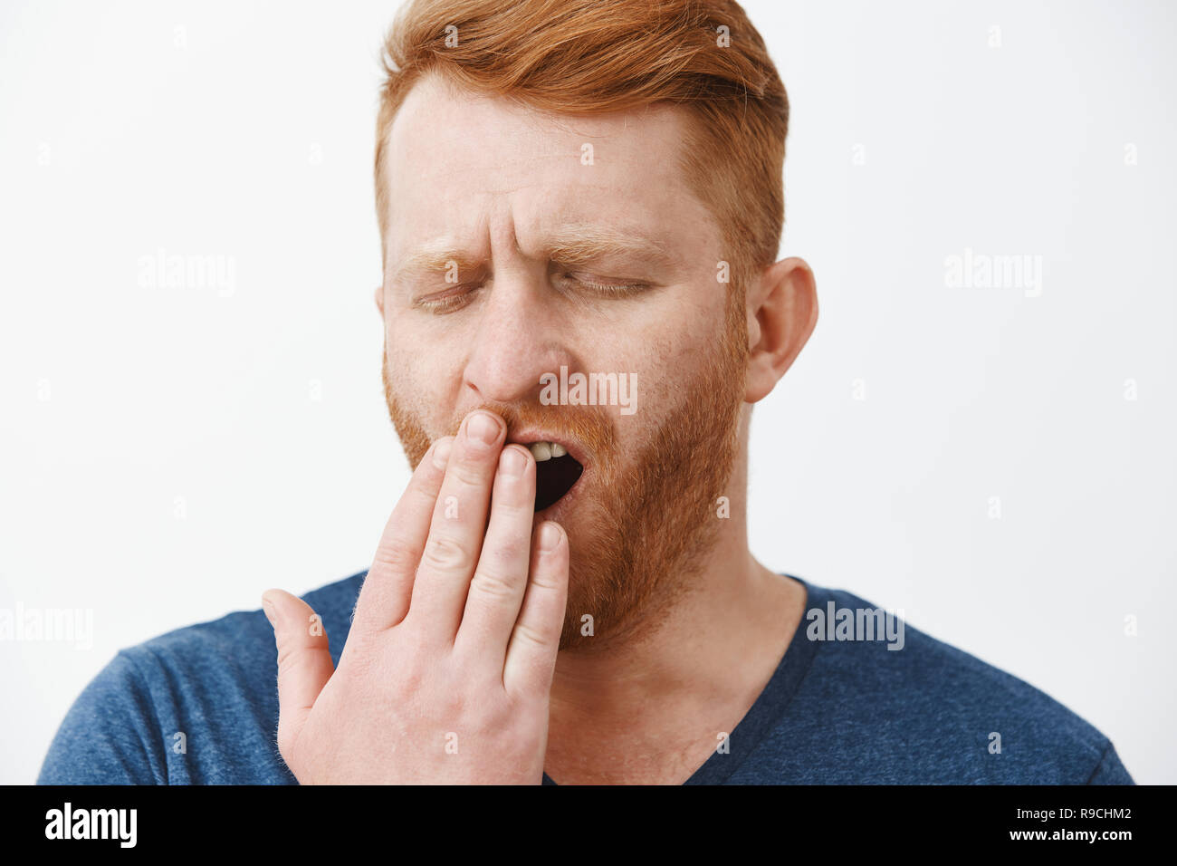 Portrait sleepy man taking nap hi-res stock photography and images - Alamy