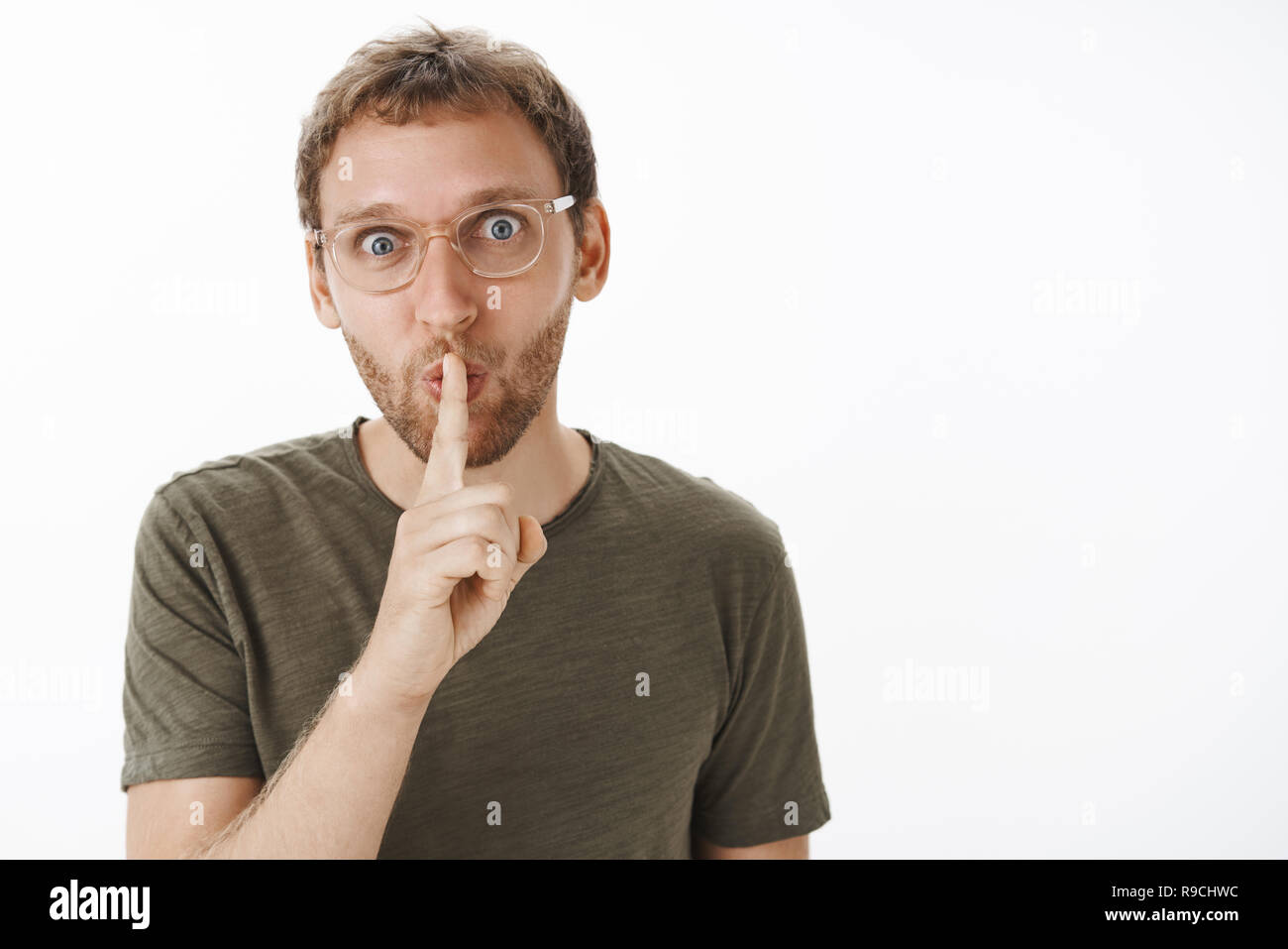 Keep voice down it surprise. Portrait of enthusiastic funny and joyful ...