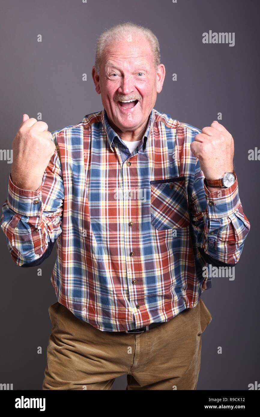 Beautiful old man in front of a background Stock Photo - Alamy