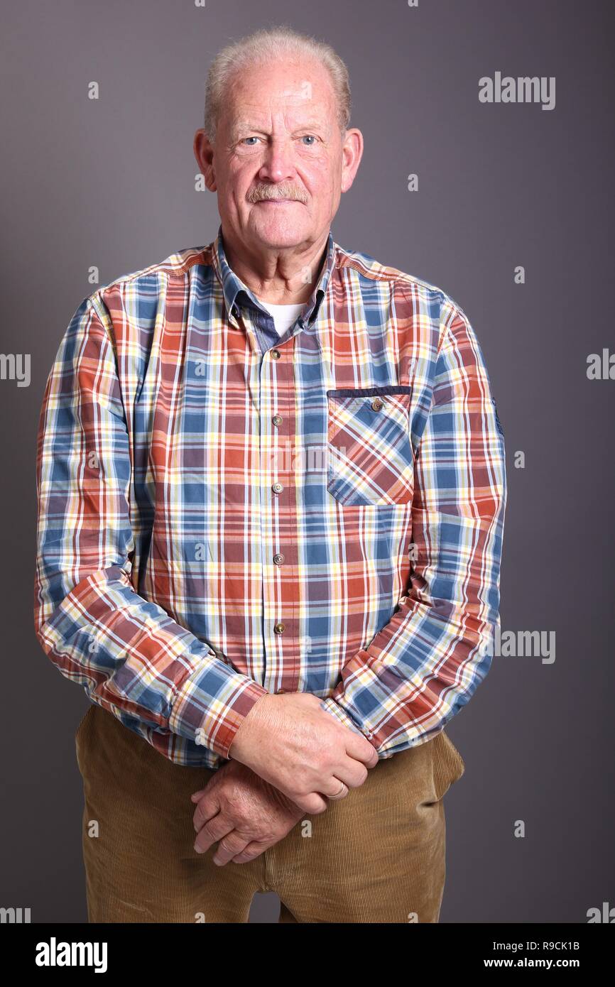 Beautiful old man in front of a background Stock Photo - Alamy