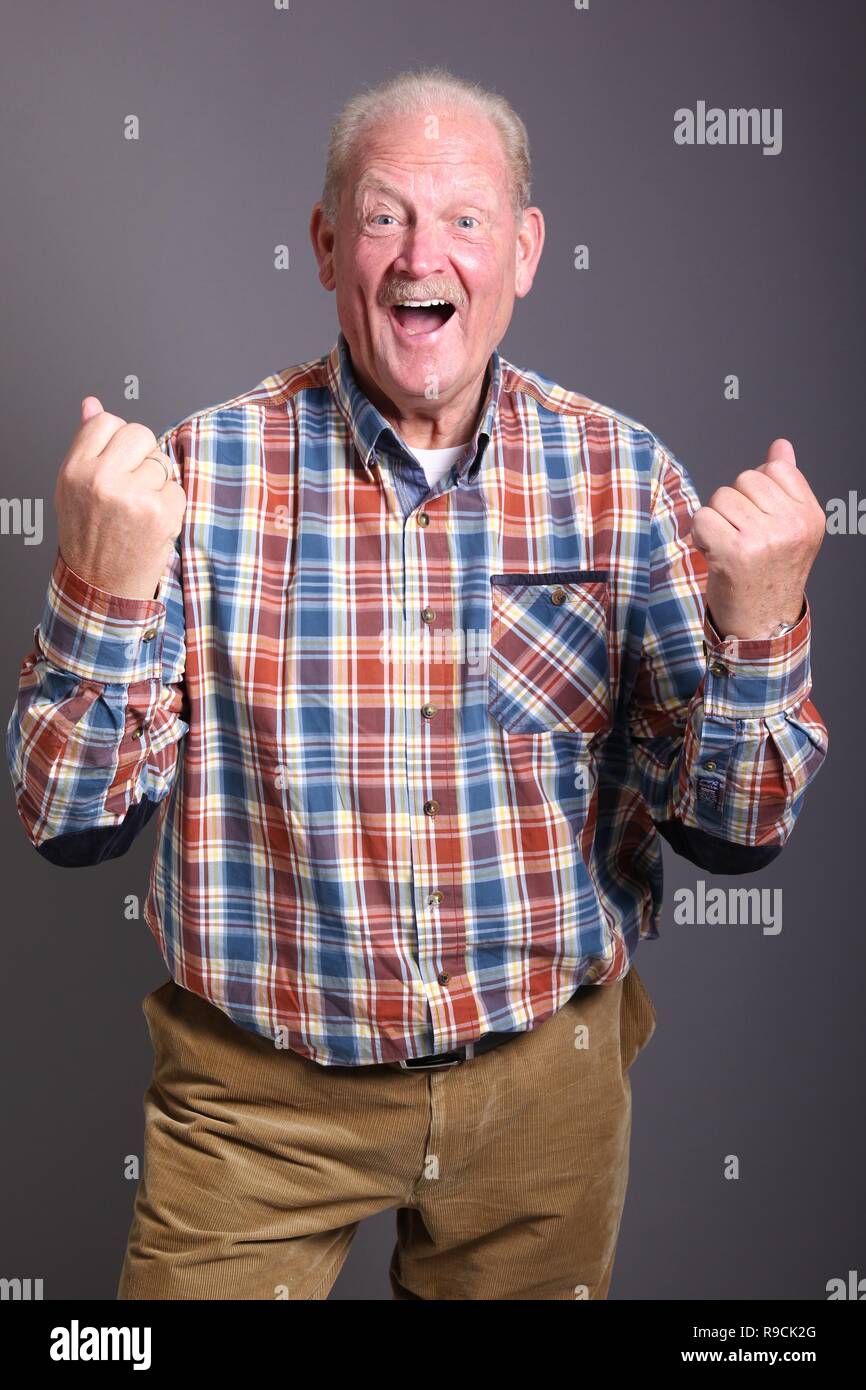 Beautiful old man in front of a background Stock Photo - Alamy