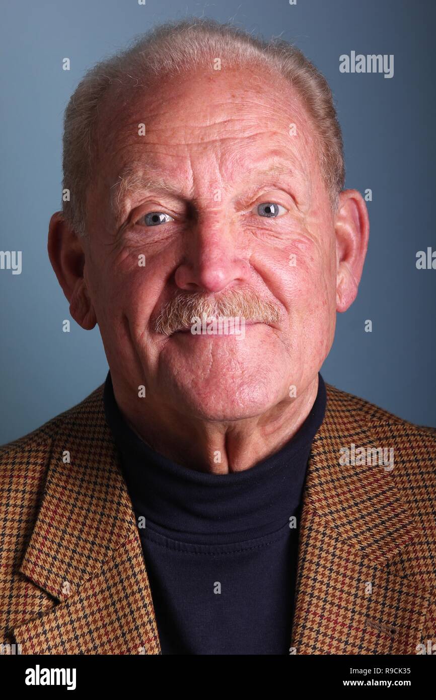 Beautiful old man in front of a background Stock Photo - Alamy