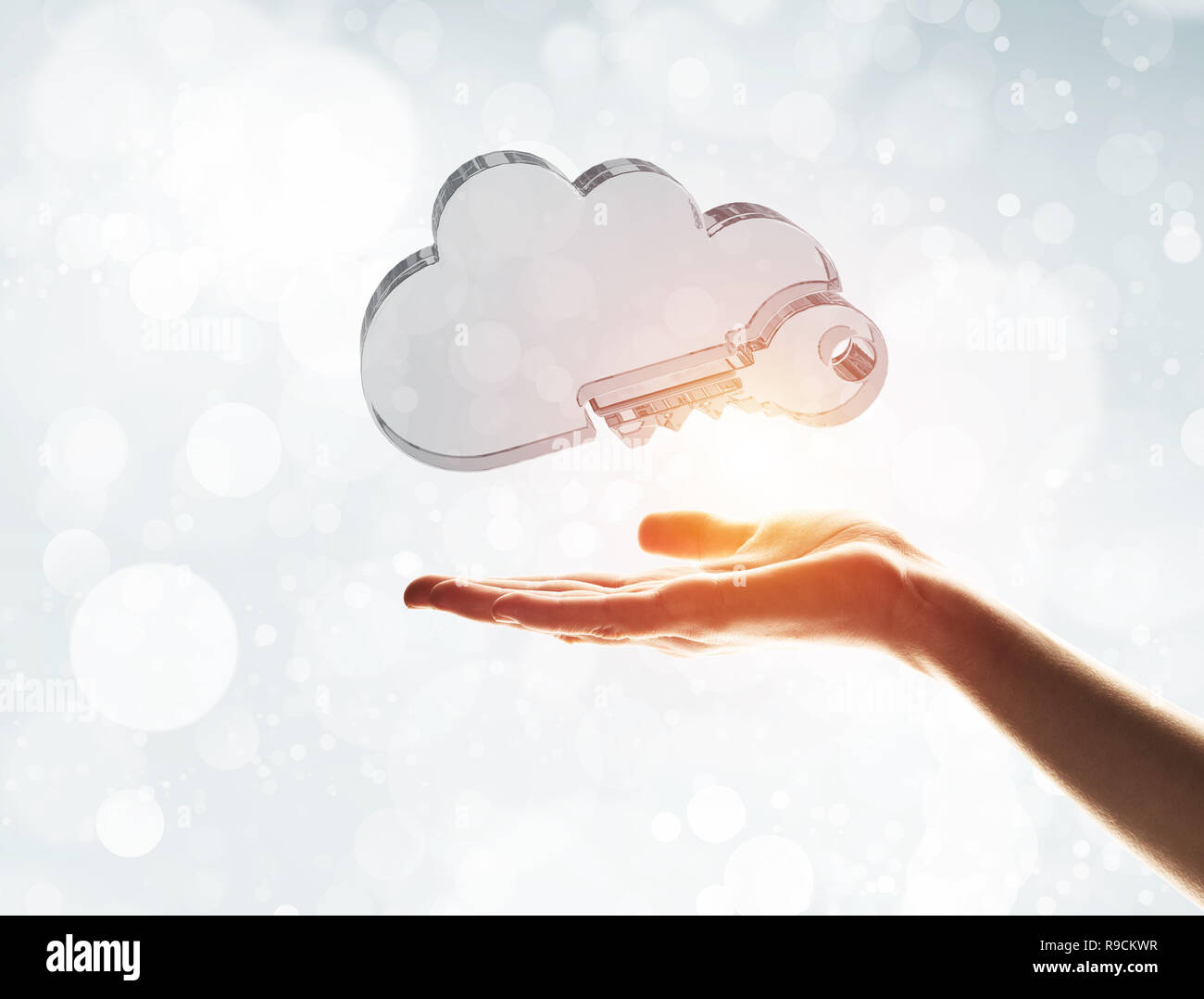 Cloud computing concept with glass symbol shown in hand Stock Photo - Alamy