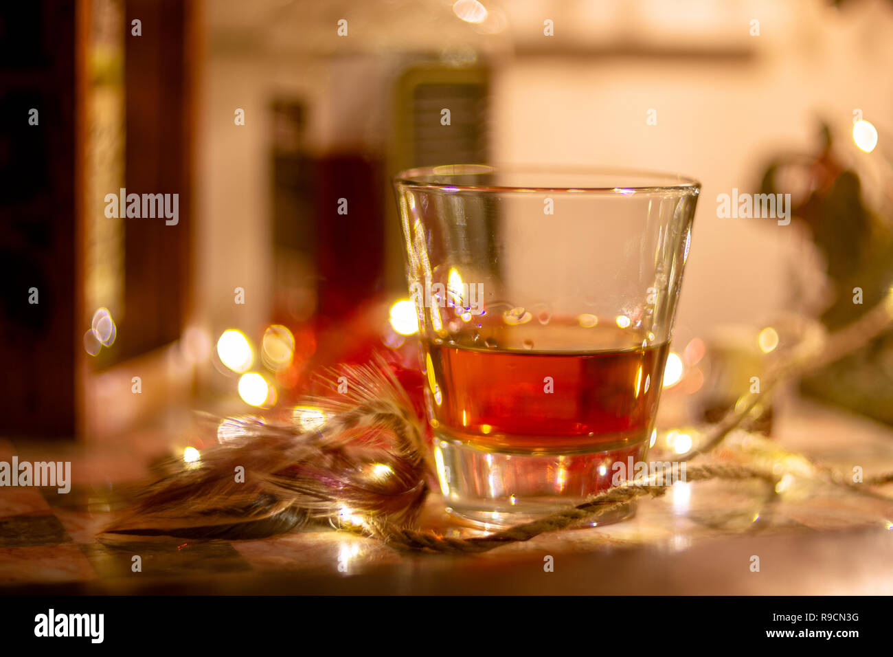 A buttery smooth shot of a glass of bourbon Stock Photo - Alamy
