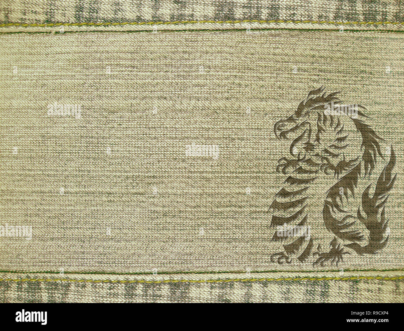 Jeans background of beige color, with dragon Stock Photo - Alamy