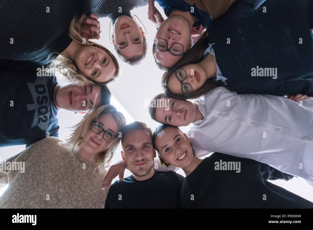 Group of young students in electronics classroom celebrating ...