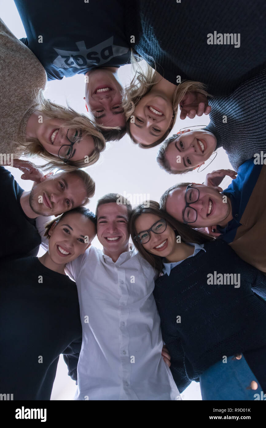 Group of young students in electronics classroom celebrating ...