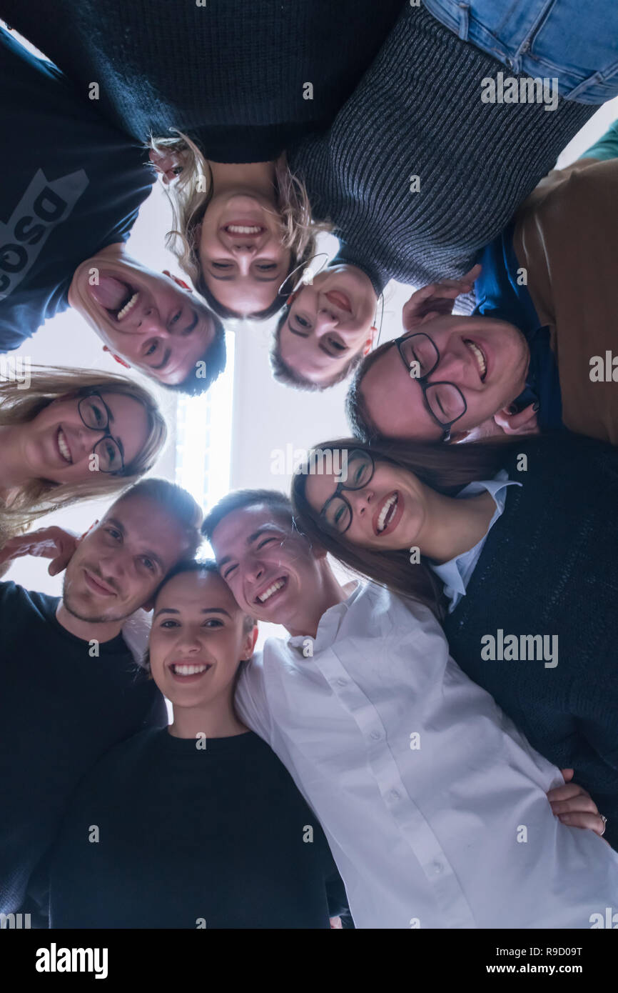 Group of young students in electronics classroom celebrating ...