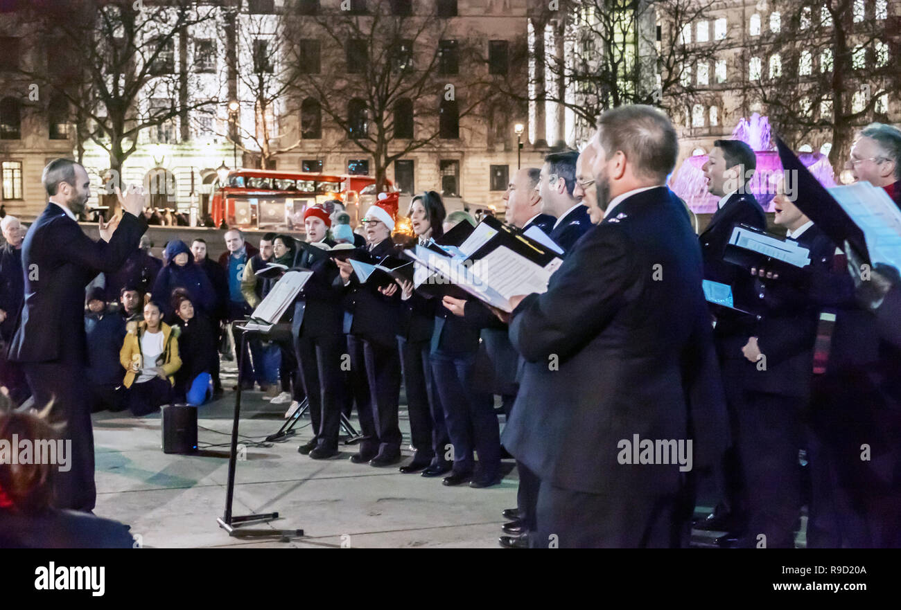 Metropolitan Police Choir sing Christmas carols at Trafalgar Square ...