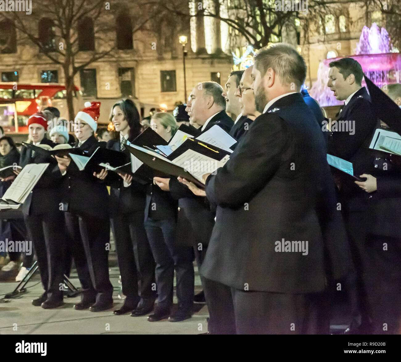 Metropolitan Police Choir sing Christmas carols at Trafalgar Square ...