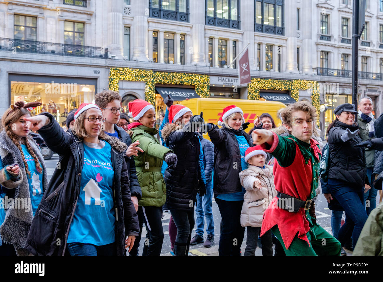 Hamleys’ Elf Mike Rogers impromptu dances with volunteers from London’s ...
