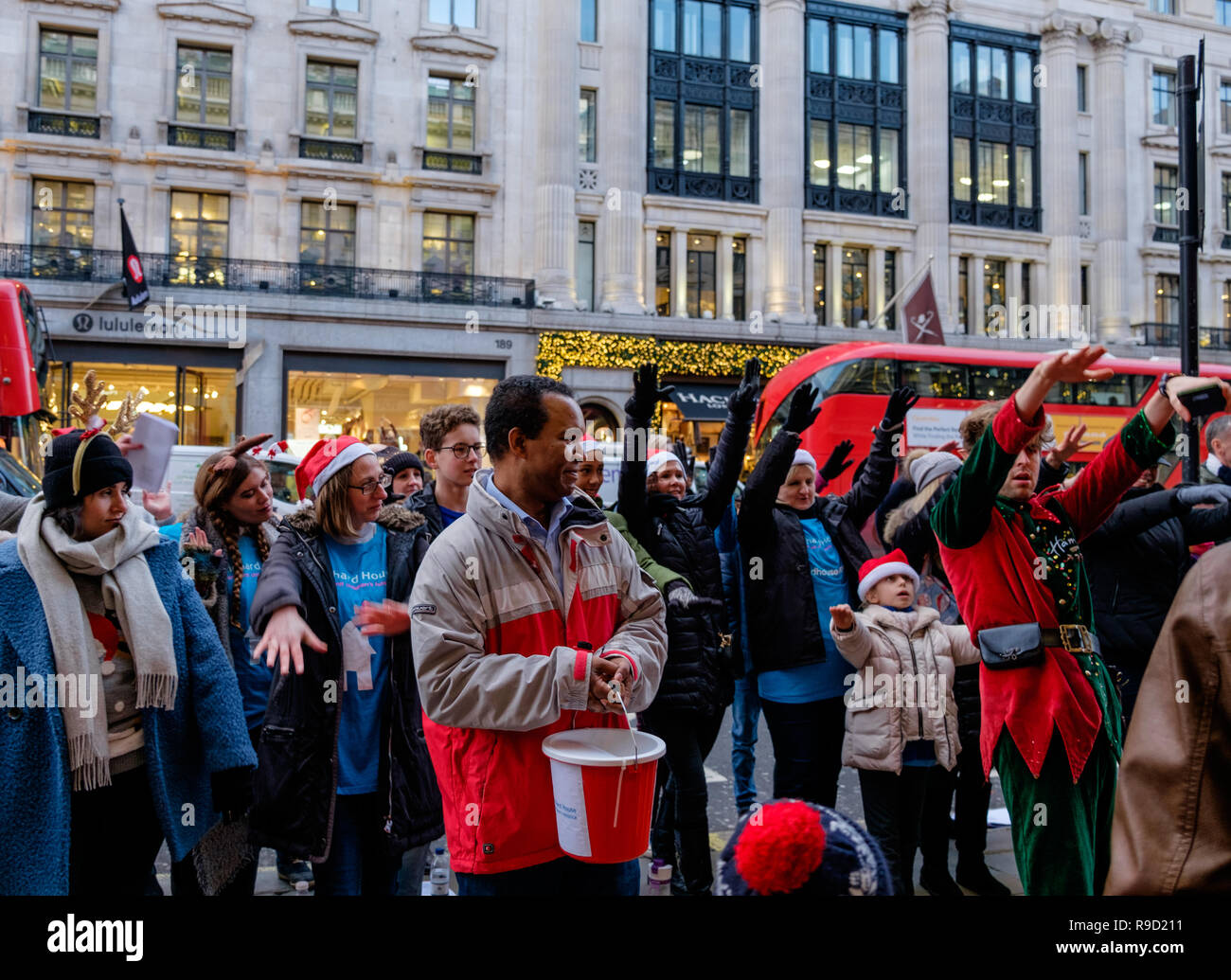 Hamleys’ Elf Mike Rogers impromptu dances with volunteers from London’s ...