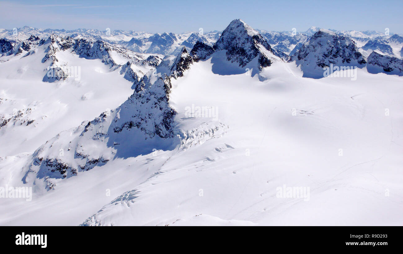 winter mountain landscape in the Silvretta mountain range in the Swiss ...