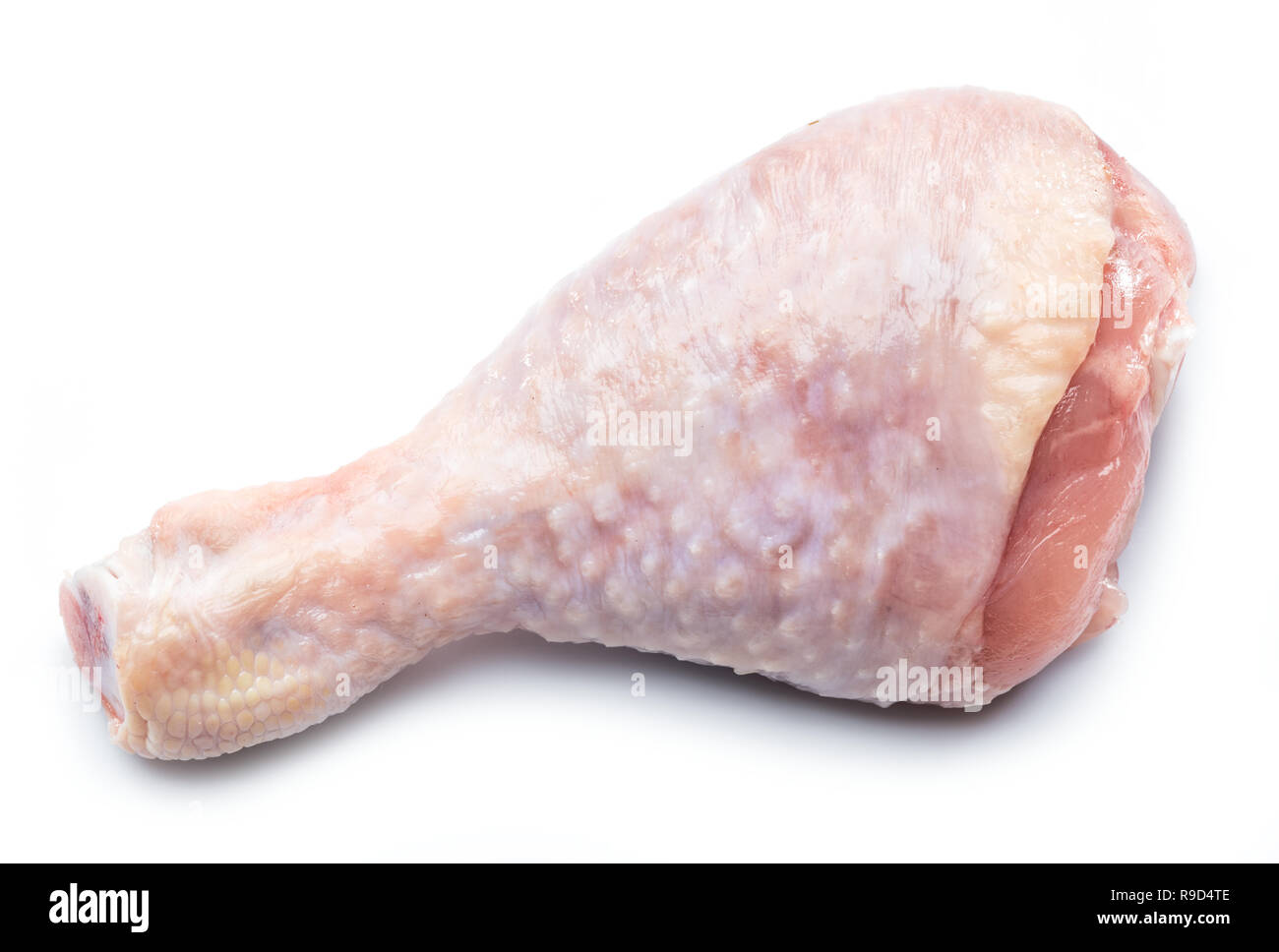 Raw chicken leg isolated on white background Stock Photo - Alamy