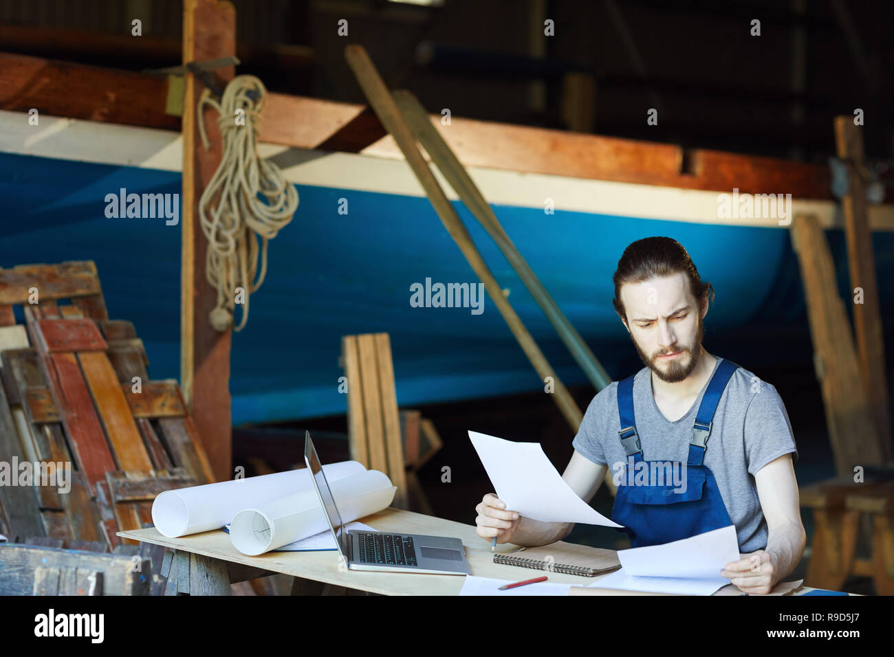 Engineer with papers Stock Photo - Alamy