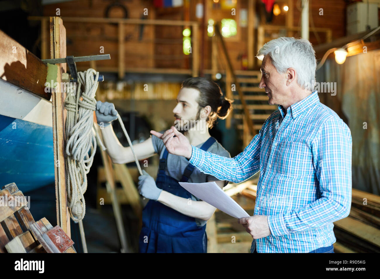 Working in shipyard Stock Photo - Alamy