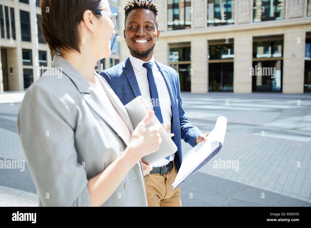 Young cheerful office managers hi-res stock photography and images - Alamy