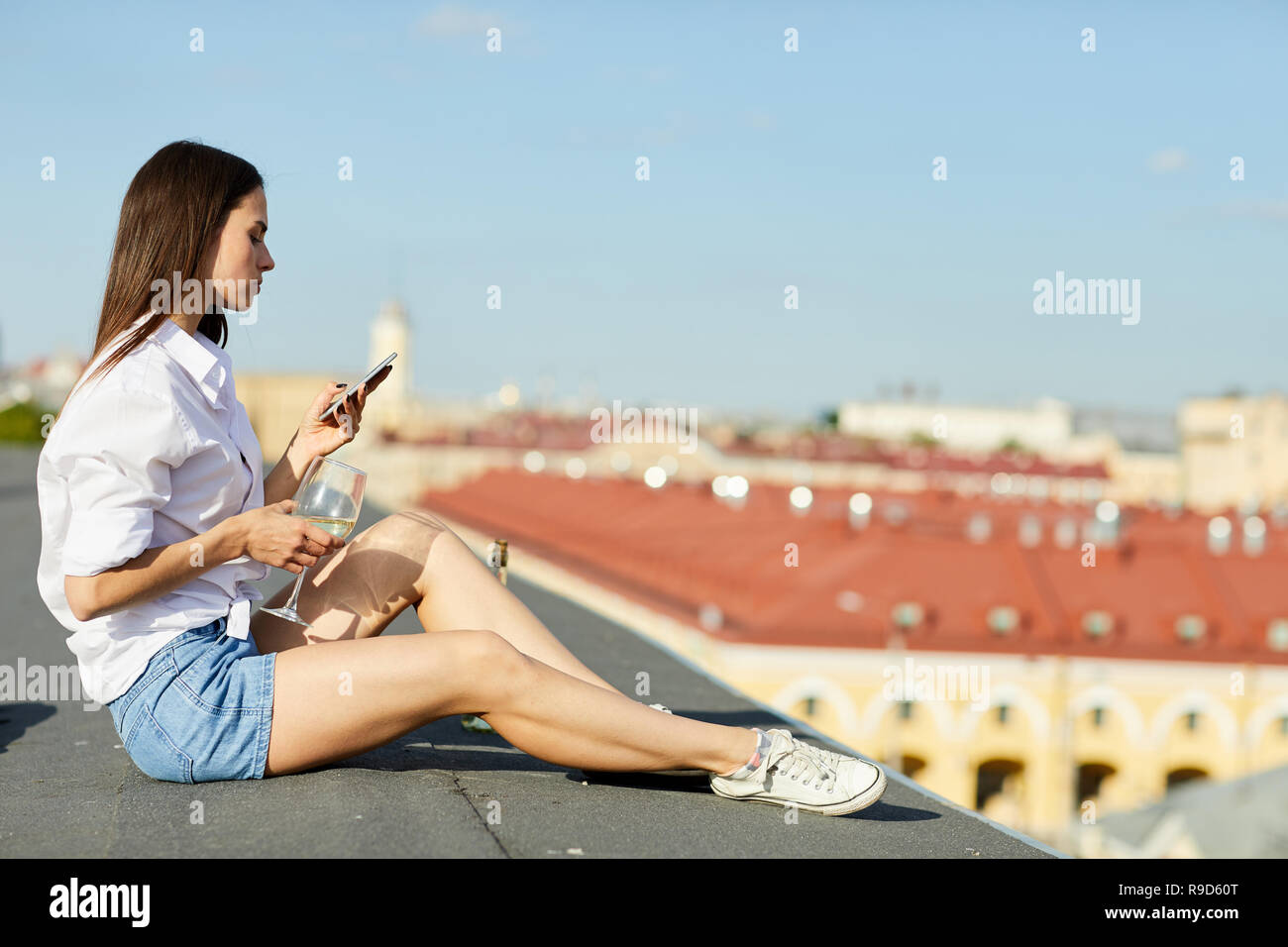 Chill on roof Stock Photo - Alamy