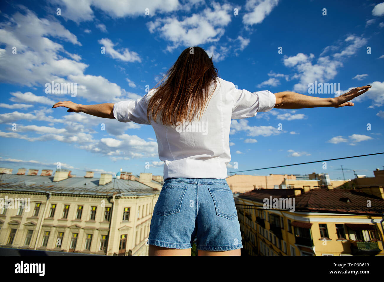 Giving hug to city Stock Photo - Alamy