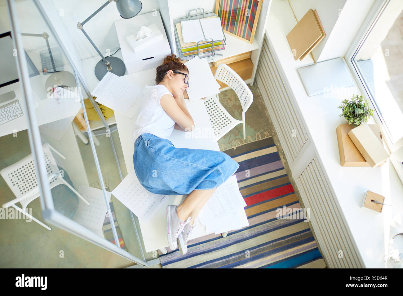 Siesta in office Stock Photo - Alamy