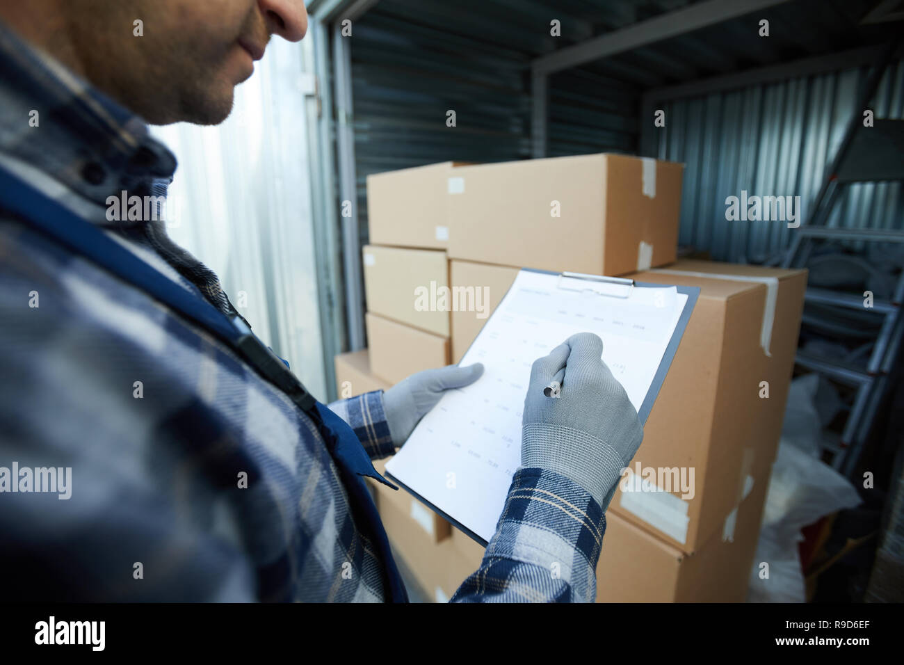 Port worker checking cargo hi-res stock photography and images - Alamy