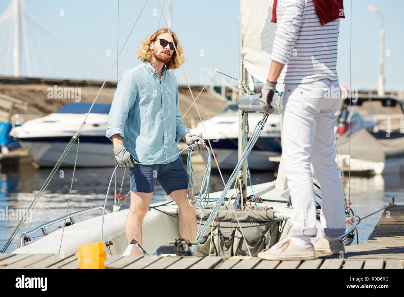 Boat crew fixing hi-res stock photography and images - Alamy