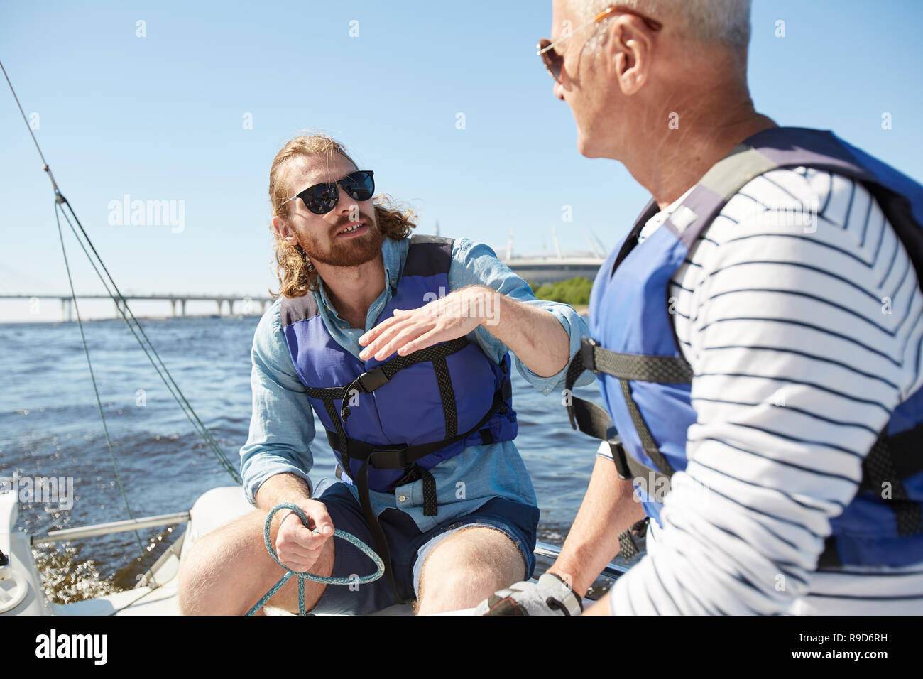 Bearded man explaining sailing rules Stock Photo - Alamy