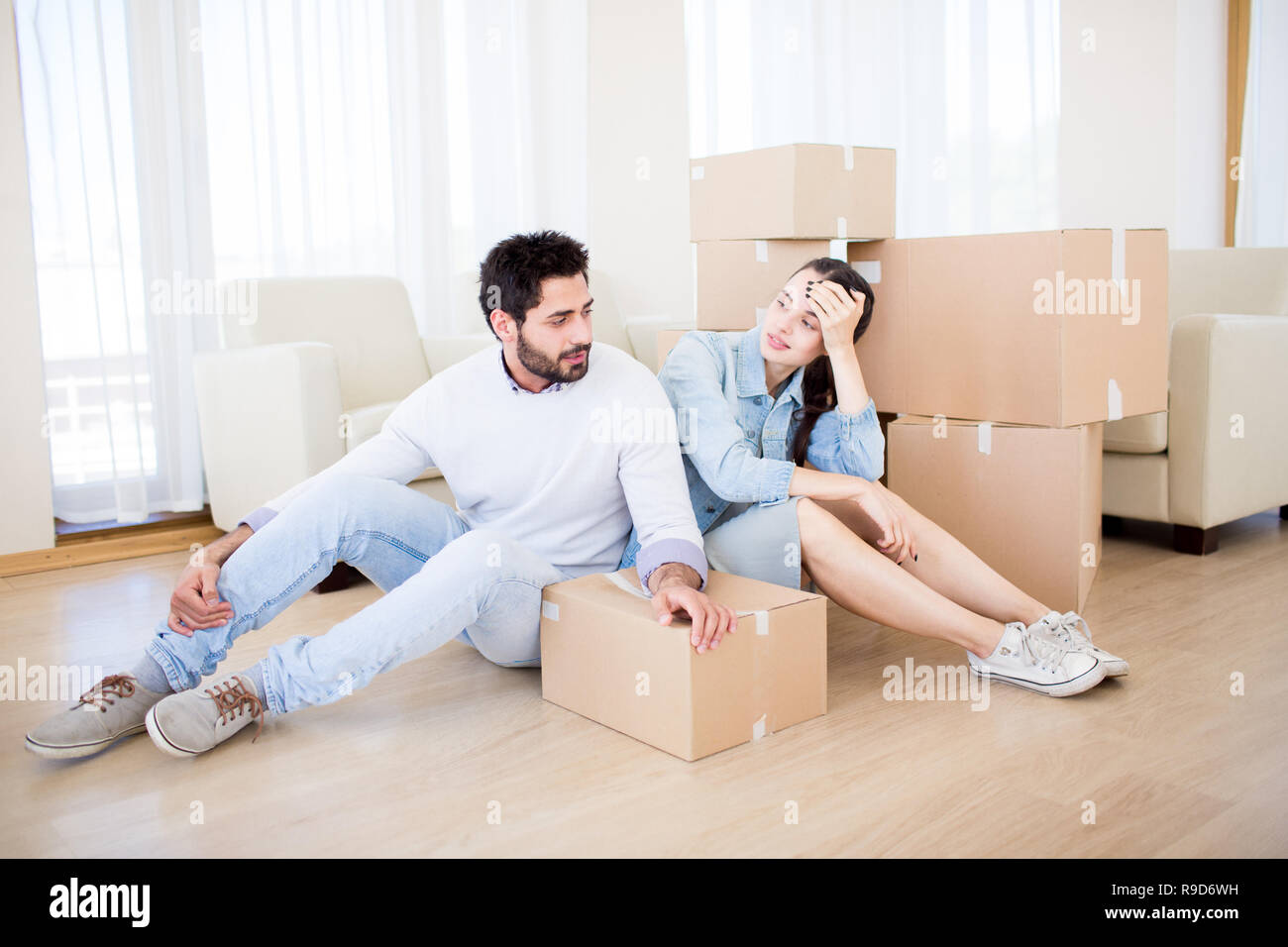 Deciding where to put boxes Stock Photo - Alamy