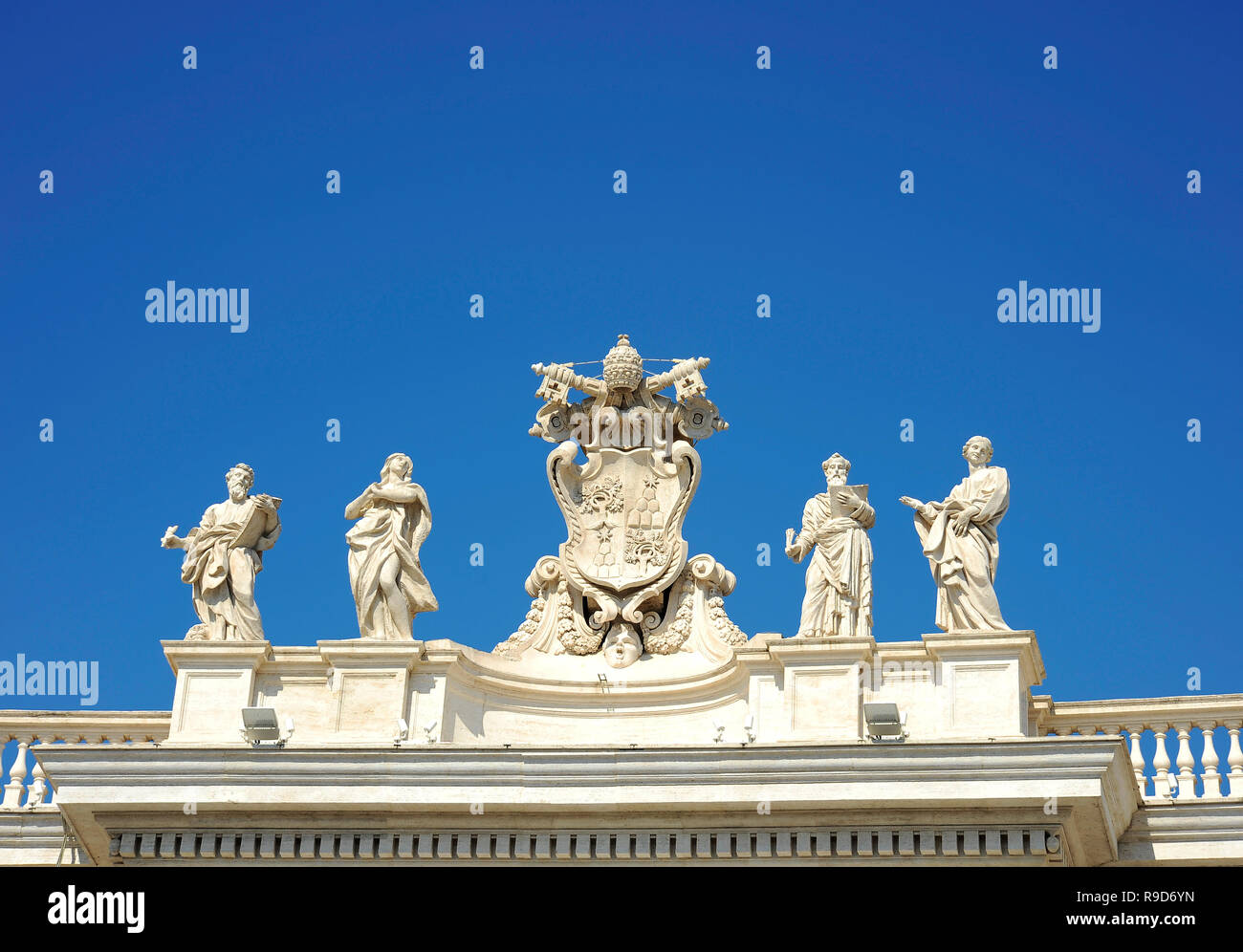 Detail from baroque Saint Peter's colonnade with beautiful statues of ...